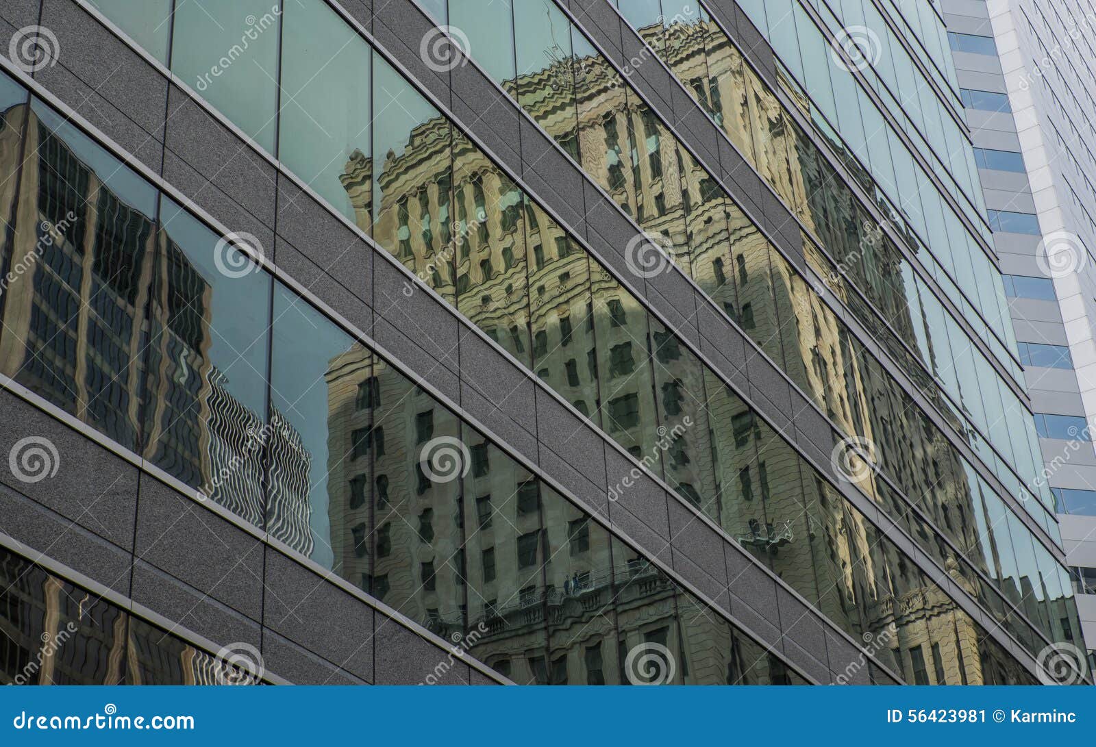 Old Office Buildings Reflected in the Glass of a Modern Office Building ...