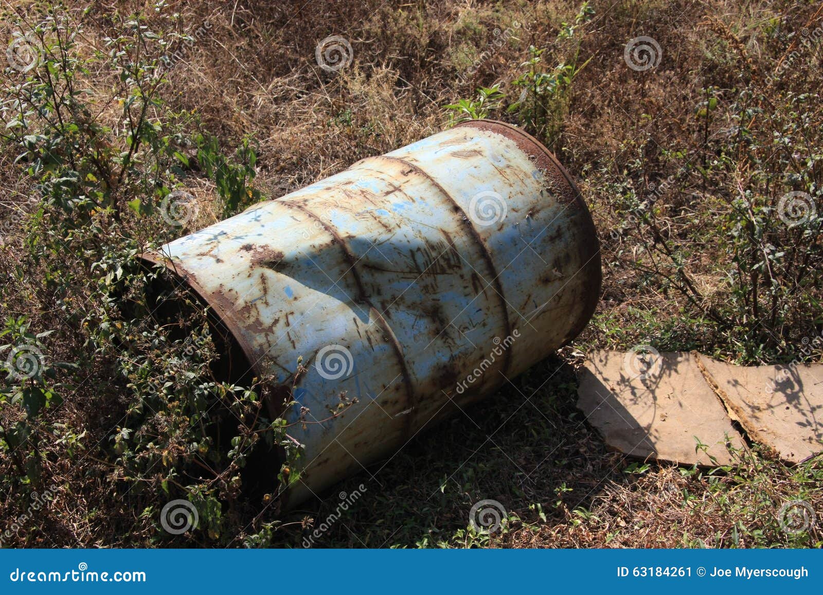 Old Oil Drum/Barrel Left Damaged on the Ground Stock Image - Image of ...