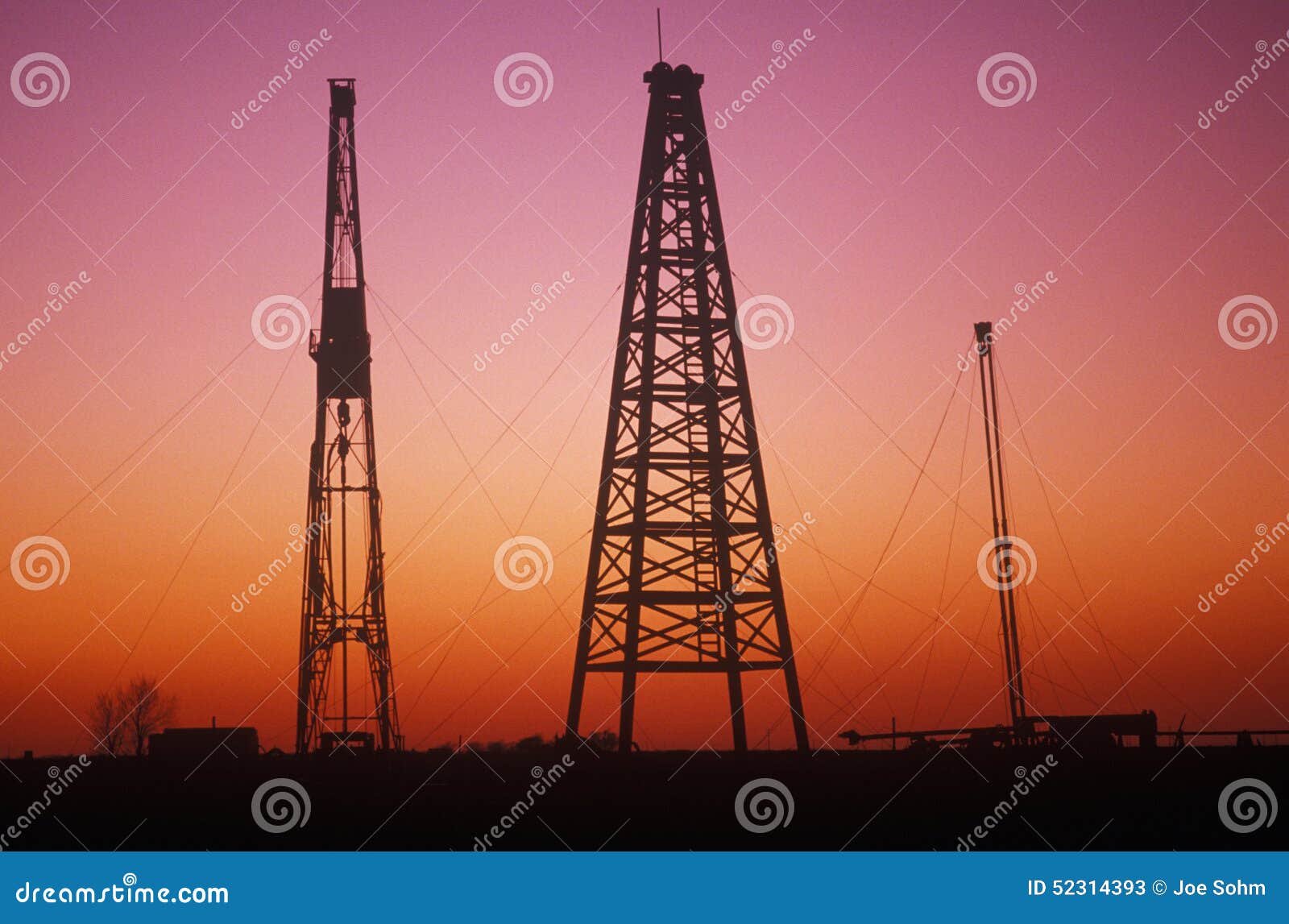 Old Oil Rig at Sunset in Russell, KS Stock Image - Image of engineering ...