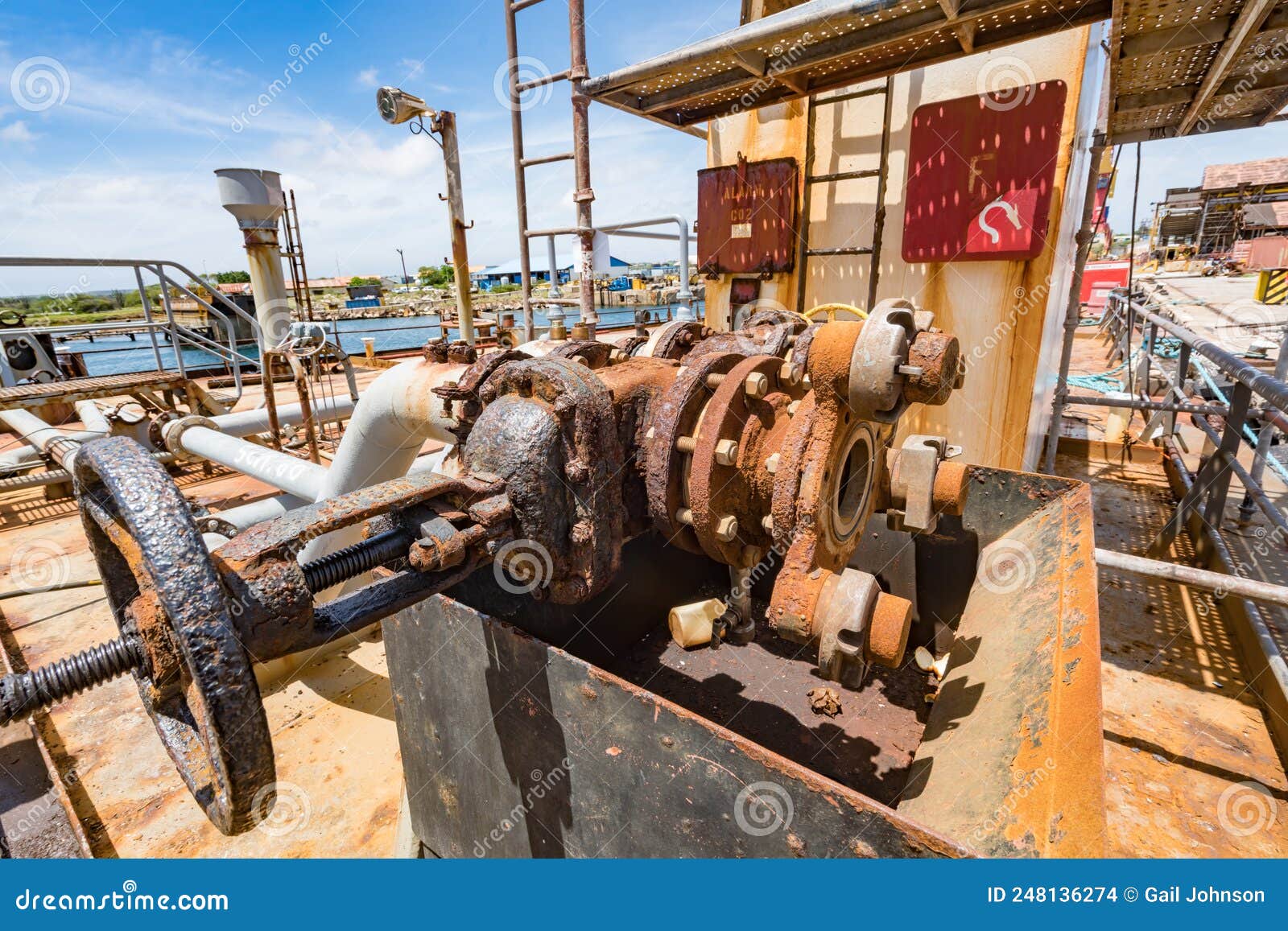An old oil tug in dry dock stock photo. Image of rusty - 248136274