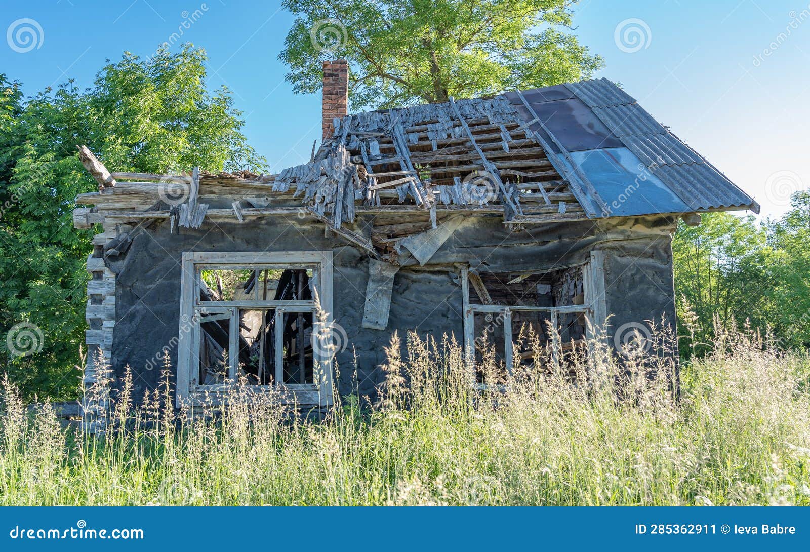 An Old One-yard with a Collapsed Roof in the Fields. Broken Windows ...