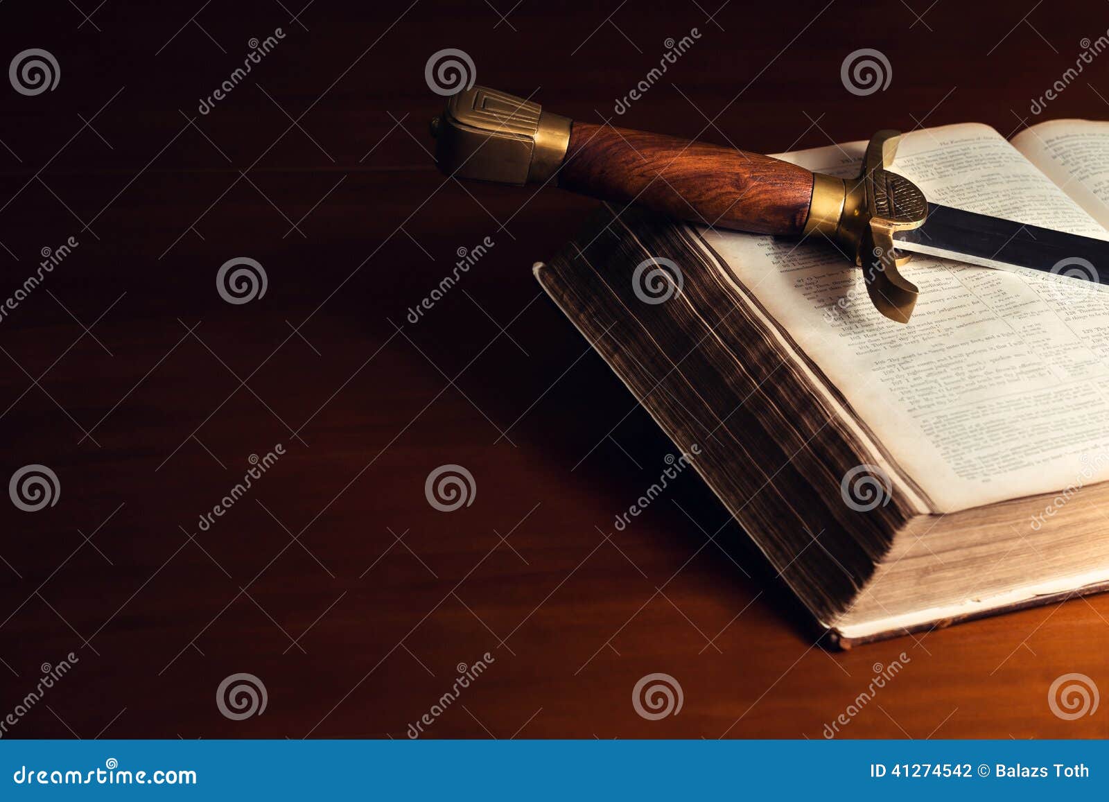 Old Open Bible With Sword Stock Photography | CartoonDealer.com #41274542
