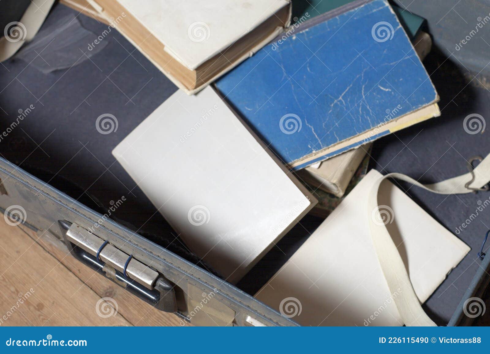 Old books in a suitcase stock photo. Image of open, suitcase - 226115490
