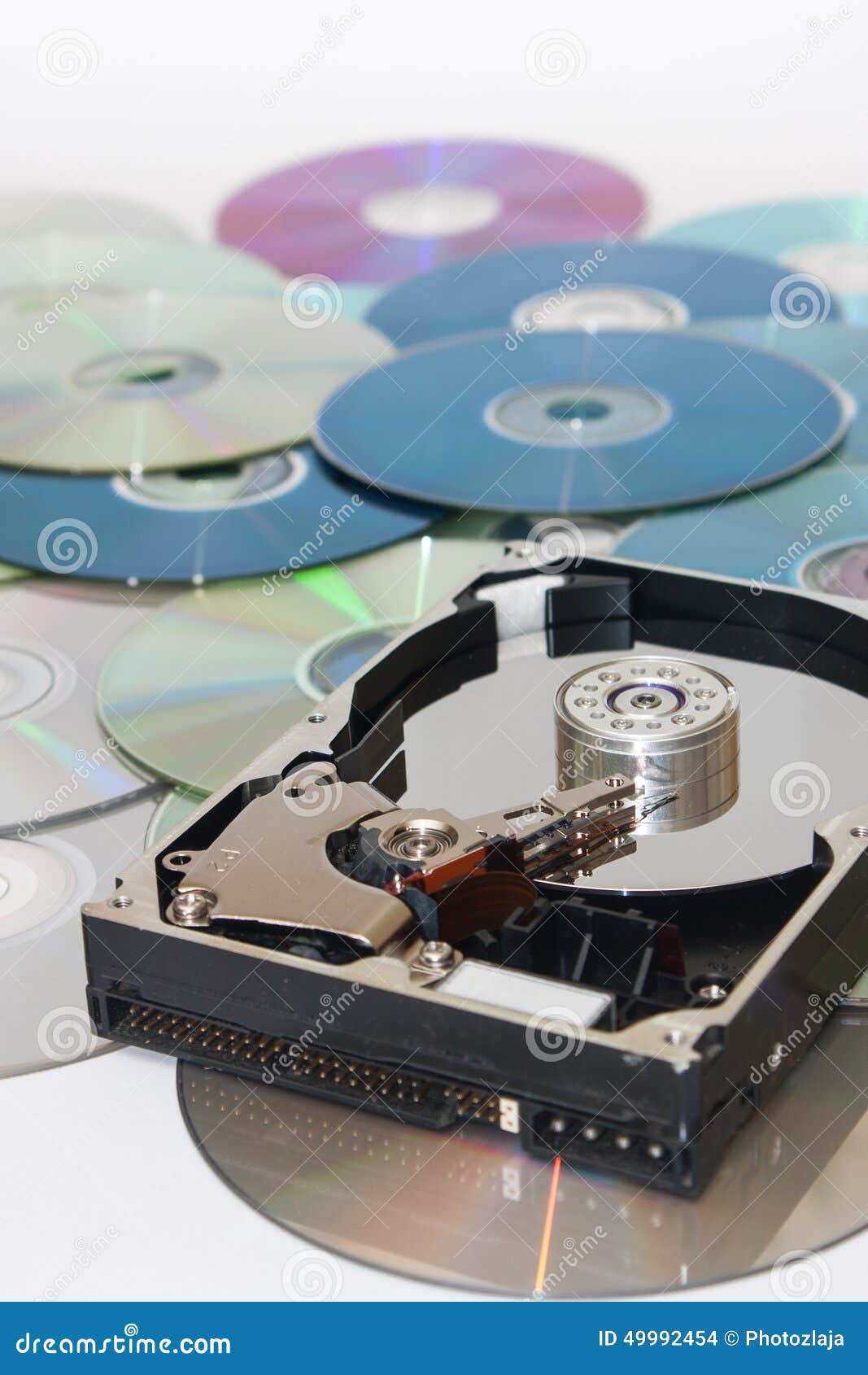 Old Opened Hard Disc on a Pile of Compact Discs Stock Photo - Image of ...
