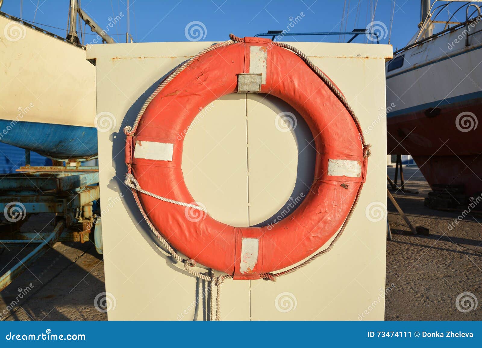 Old orange life belt stock image. Image of port, lifeguard - 73474111