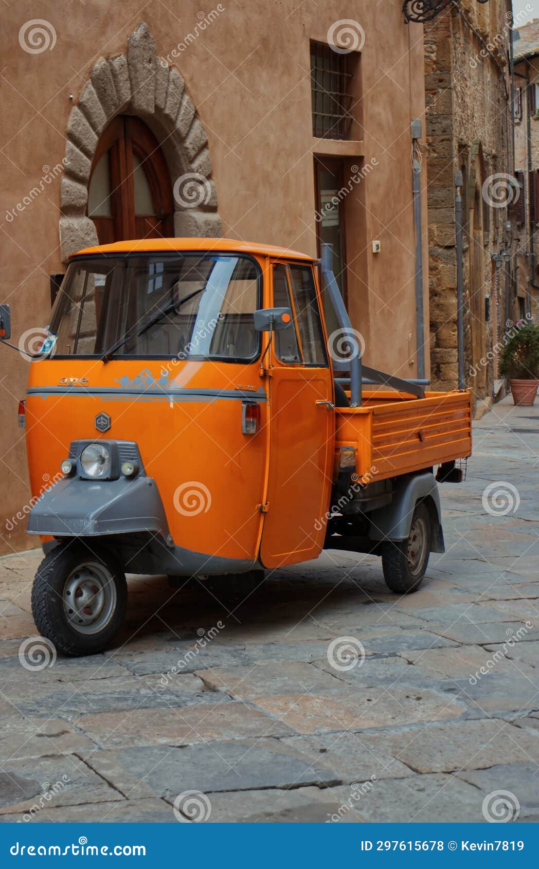 Old Orange Three-wheeler Parked Stock Photo - Image of vehicle ...