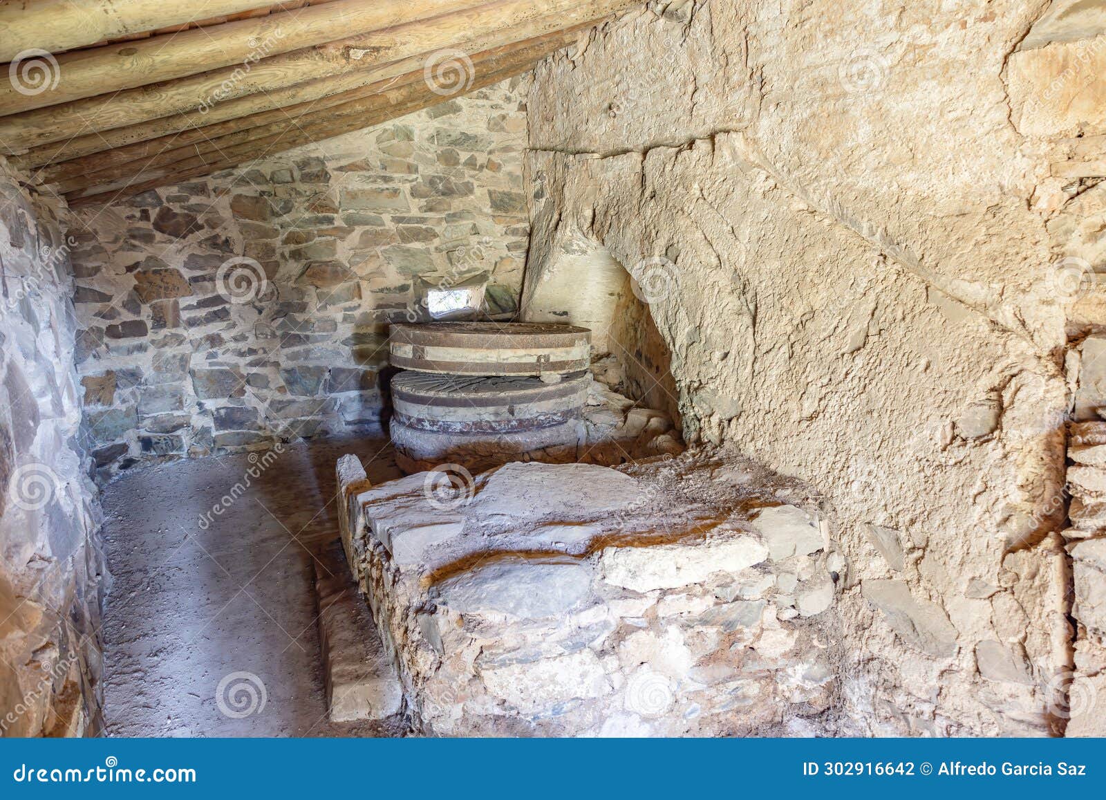 Old and Out of Use Water Mill with Focus on the Millstone Stock Photo ...