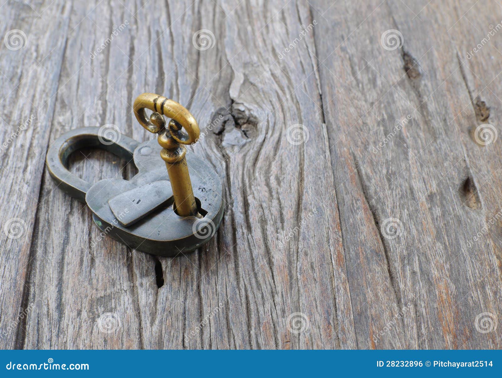 Old Padlock and Key on a Wooden Table. Stock Photo - Image of keys ...