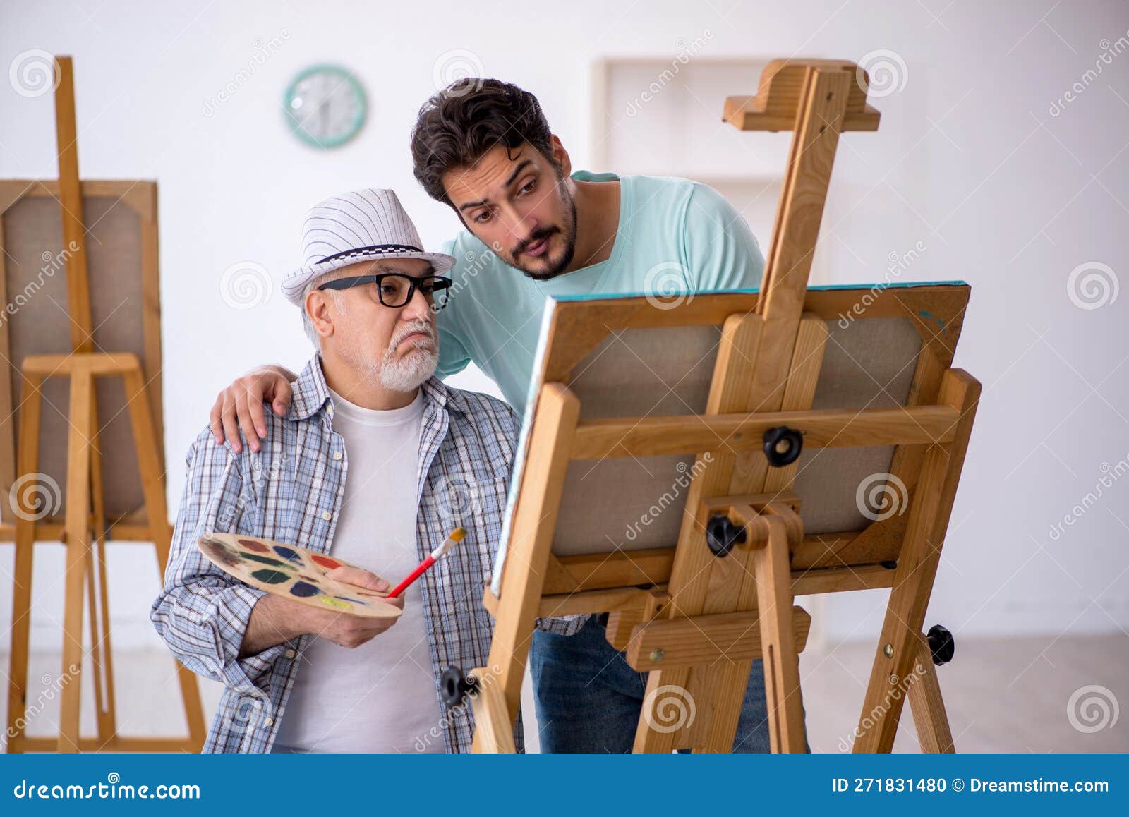 Old Painter Teaching Young Student at Studio Stock Photo - Image of ...