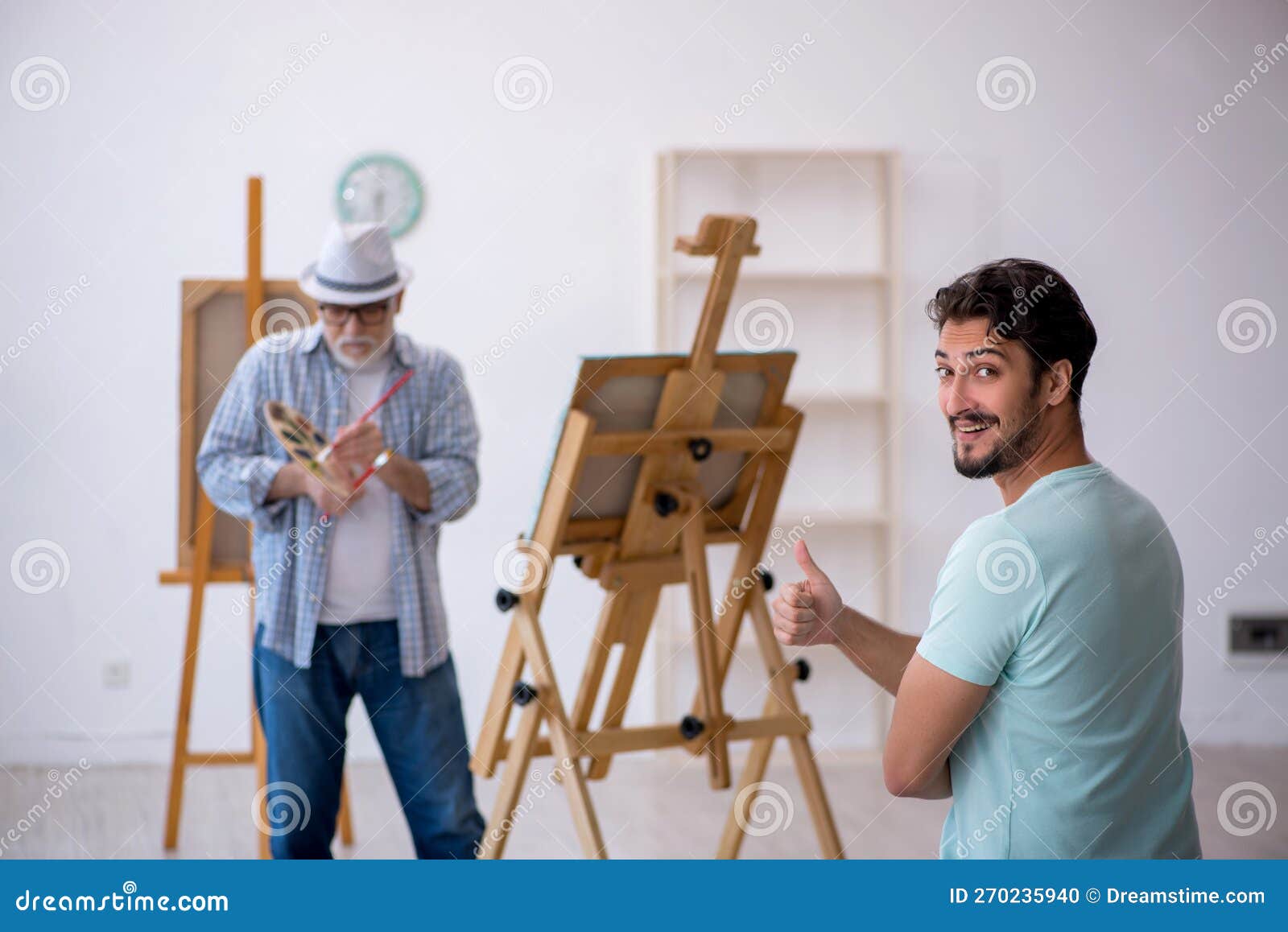 Old Painter and Young Male Model at the Studio Stock Photo - Image of ...