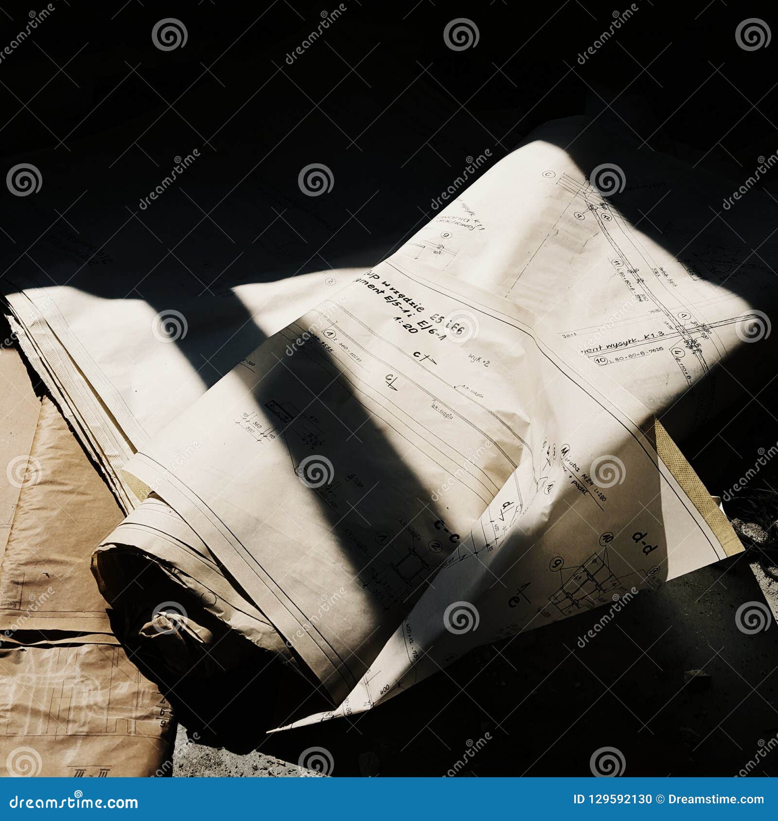 Old Paper Sketches on the Ground in the Shadow Stock Photo - Image of ...