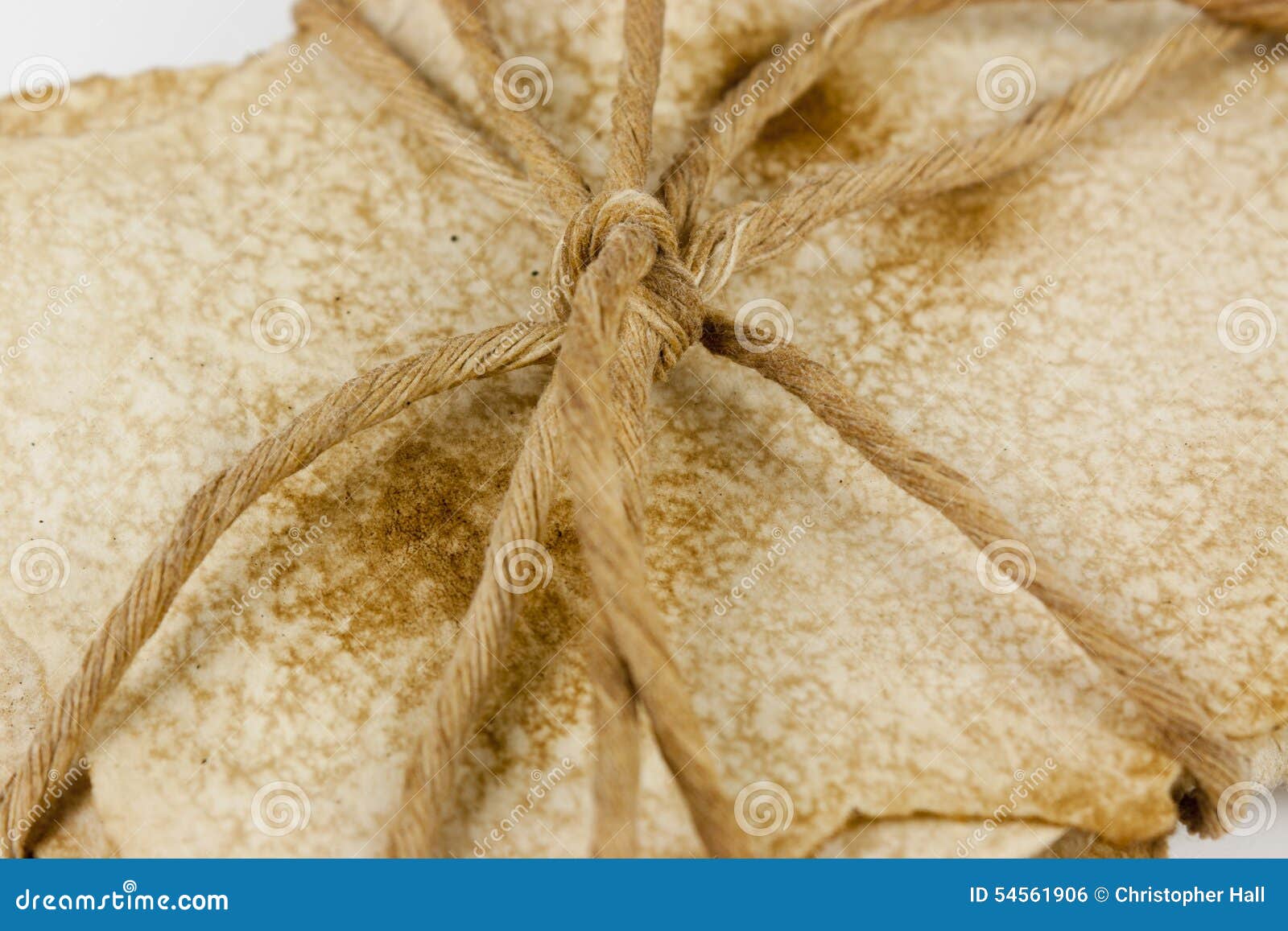 Old paper tied with string stock photo. Image of isolated - 54561906