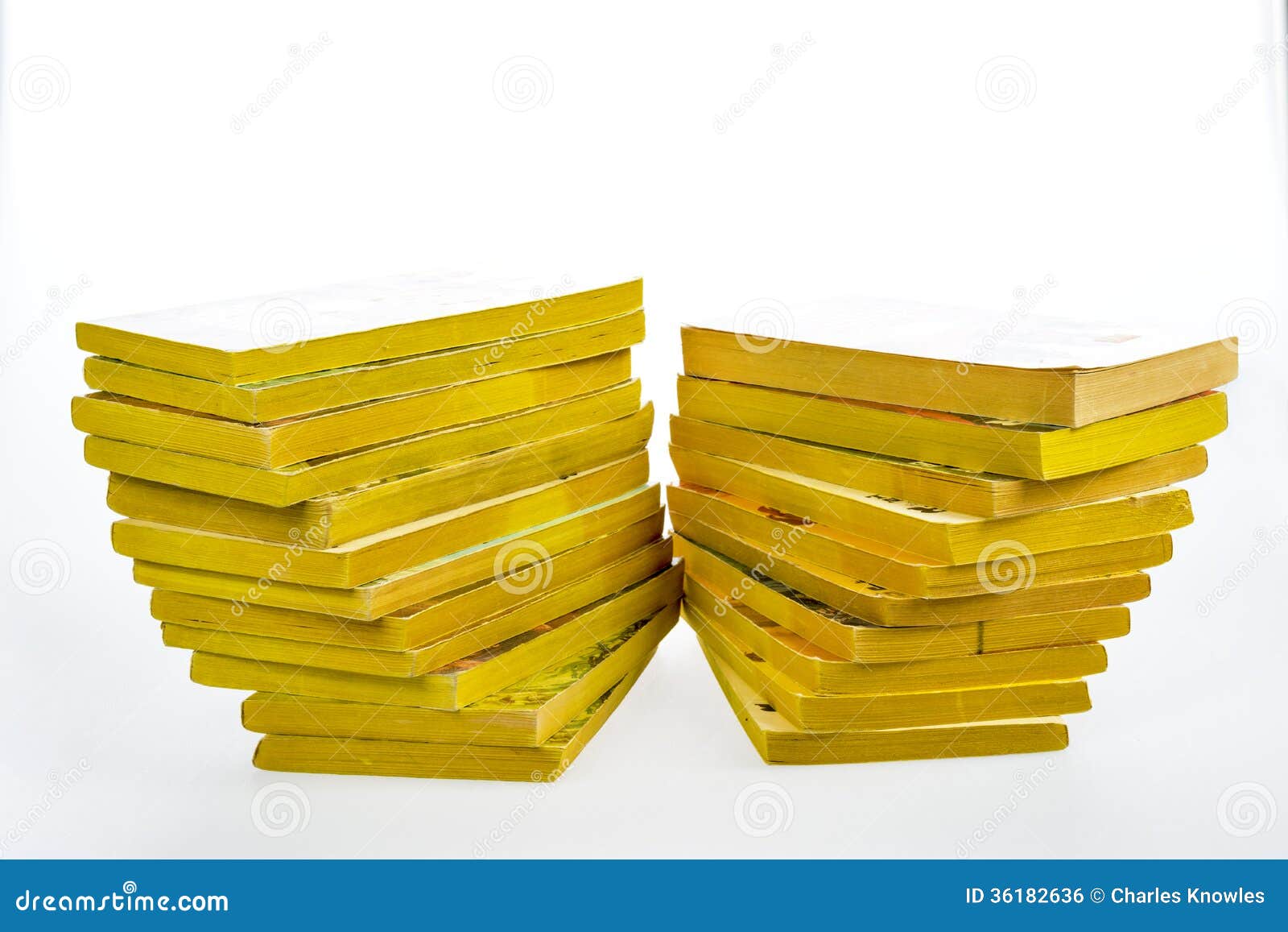 Old Paperback Books Stacked in Two Stock Photo - Image of gold ...