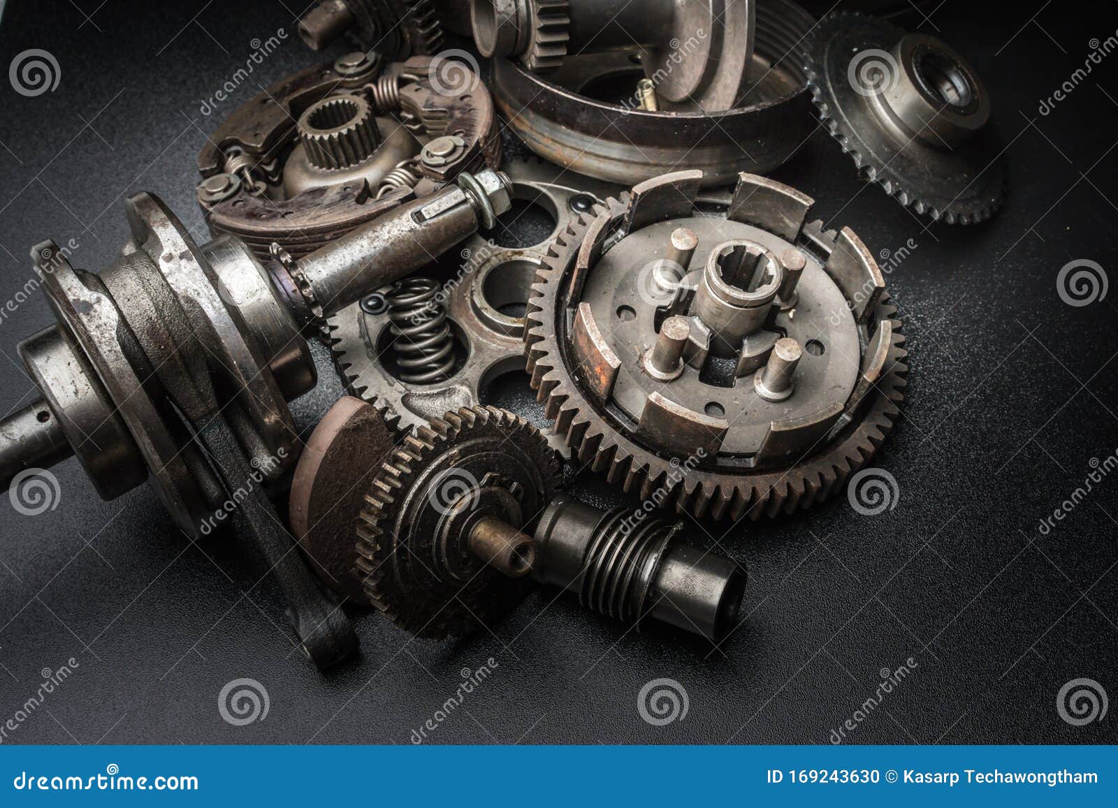 Old Parts of the Motorcycle Engine Has Been Placed on a Black ...