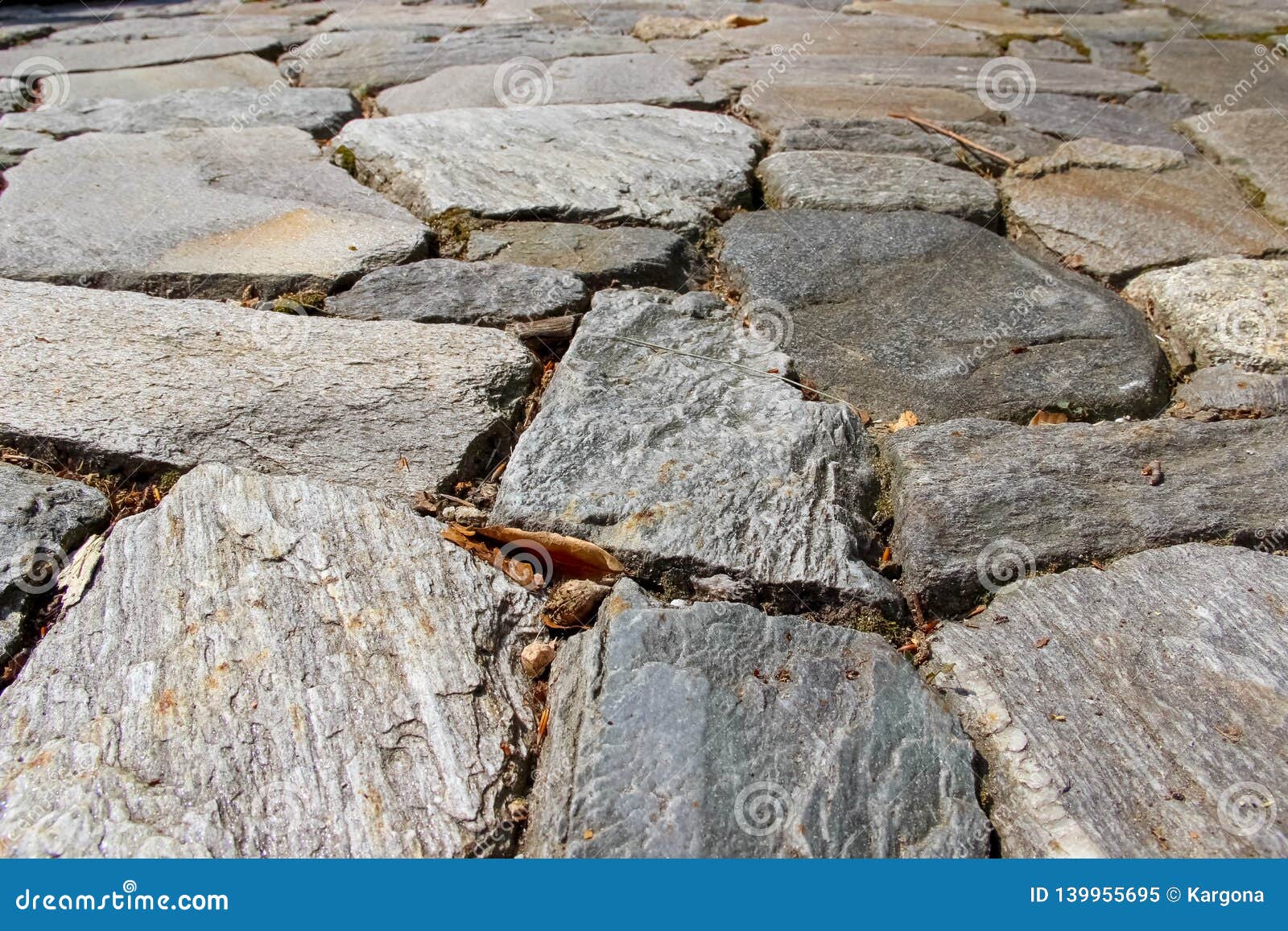 An Old Pavement Cobbled with Natural Rocks Stock Image - Image of stone ...