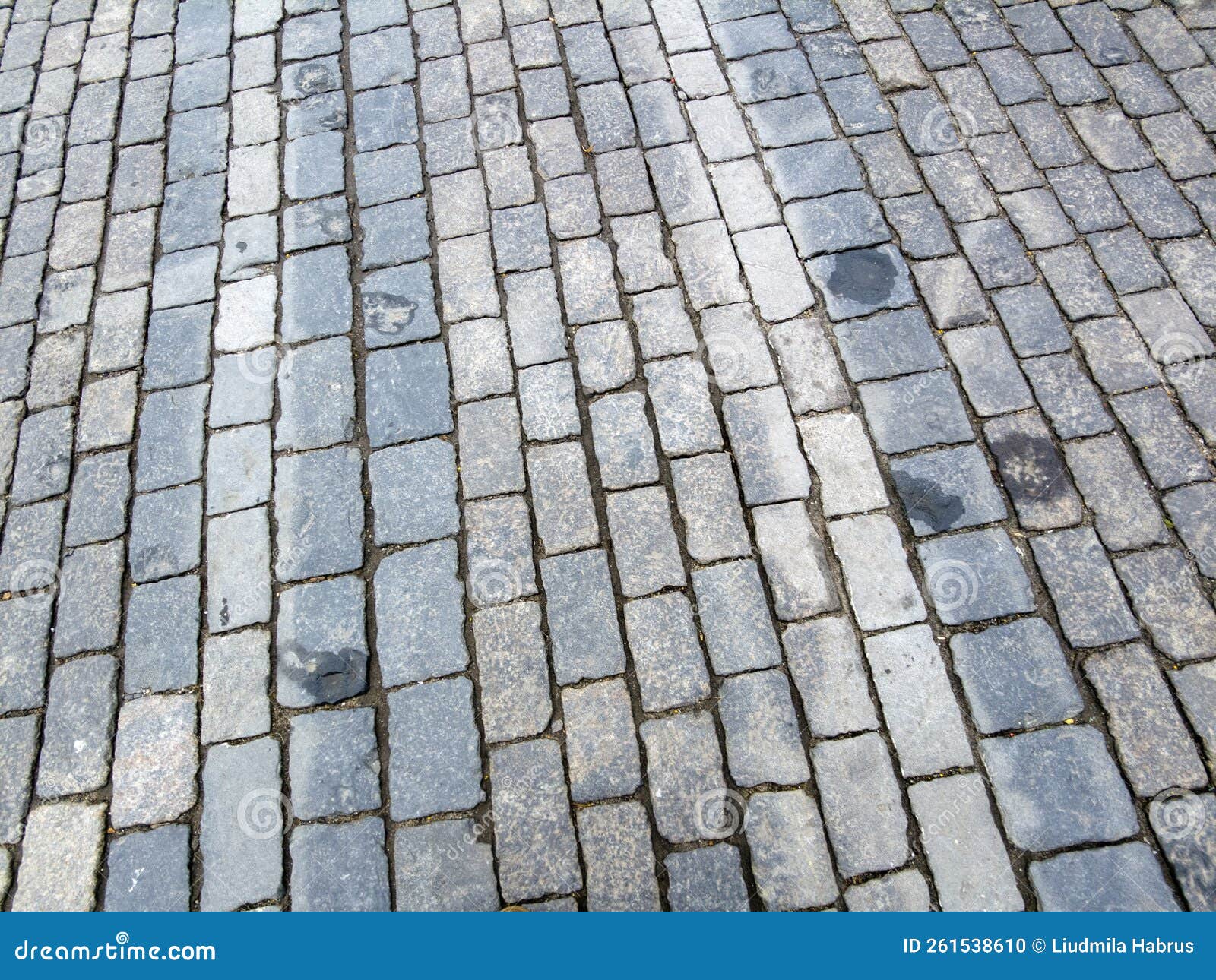 Old Paving Stones Made of Natural Stone on Red Square Stock Photo ...