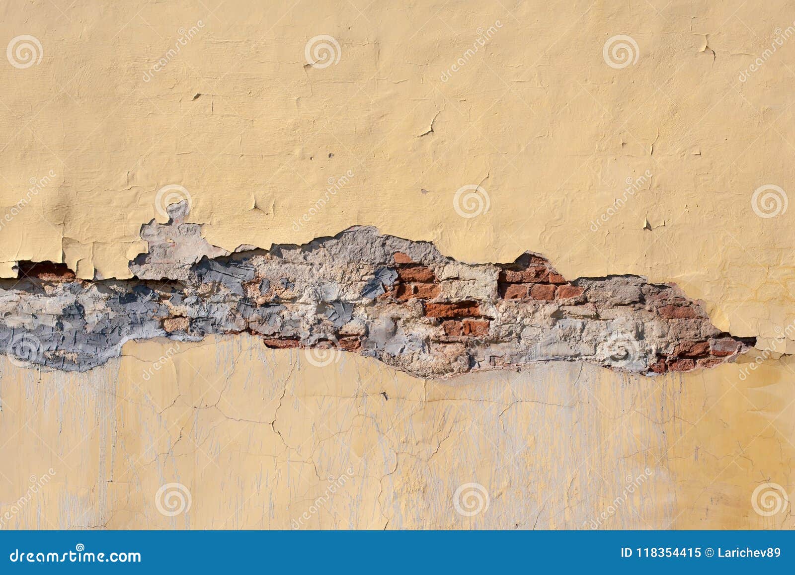An Old Peeling Yellow Wall. Collapsed Plaster and Brickwork Stock Image ...