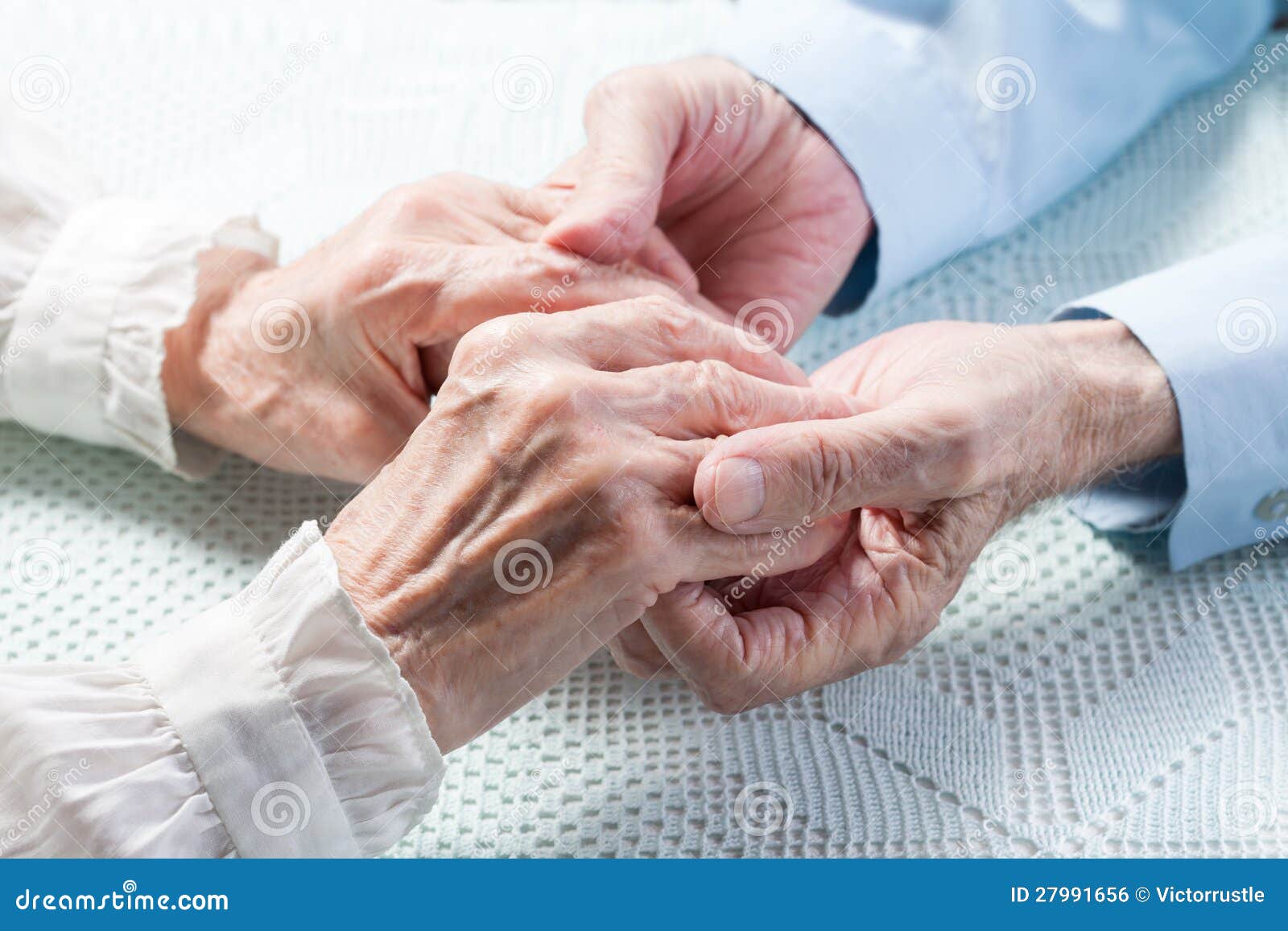 Old people holding hands stock photo. Image of mature - 27991656