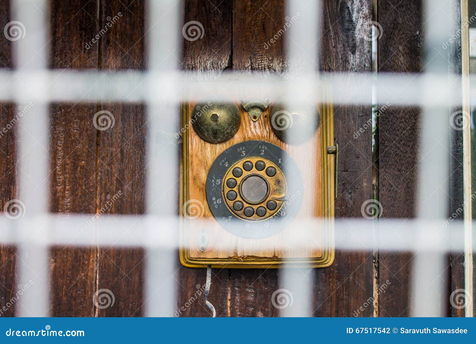 Old phone in cage stock photo. Image of cage, fence, rusty - 67517542