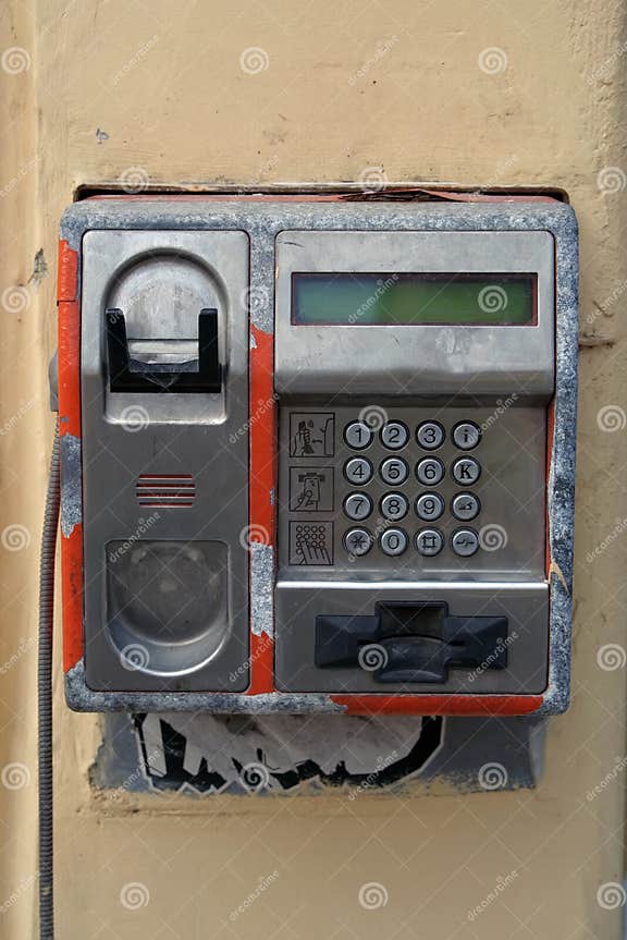Old rusty public phone stock photo. Image of earpiece - 72555602