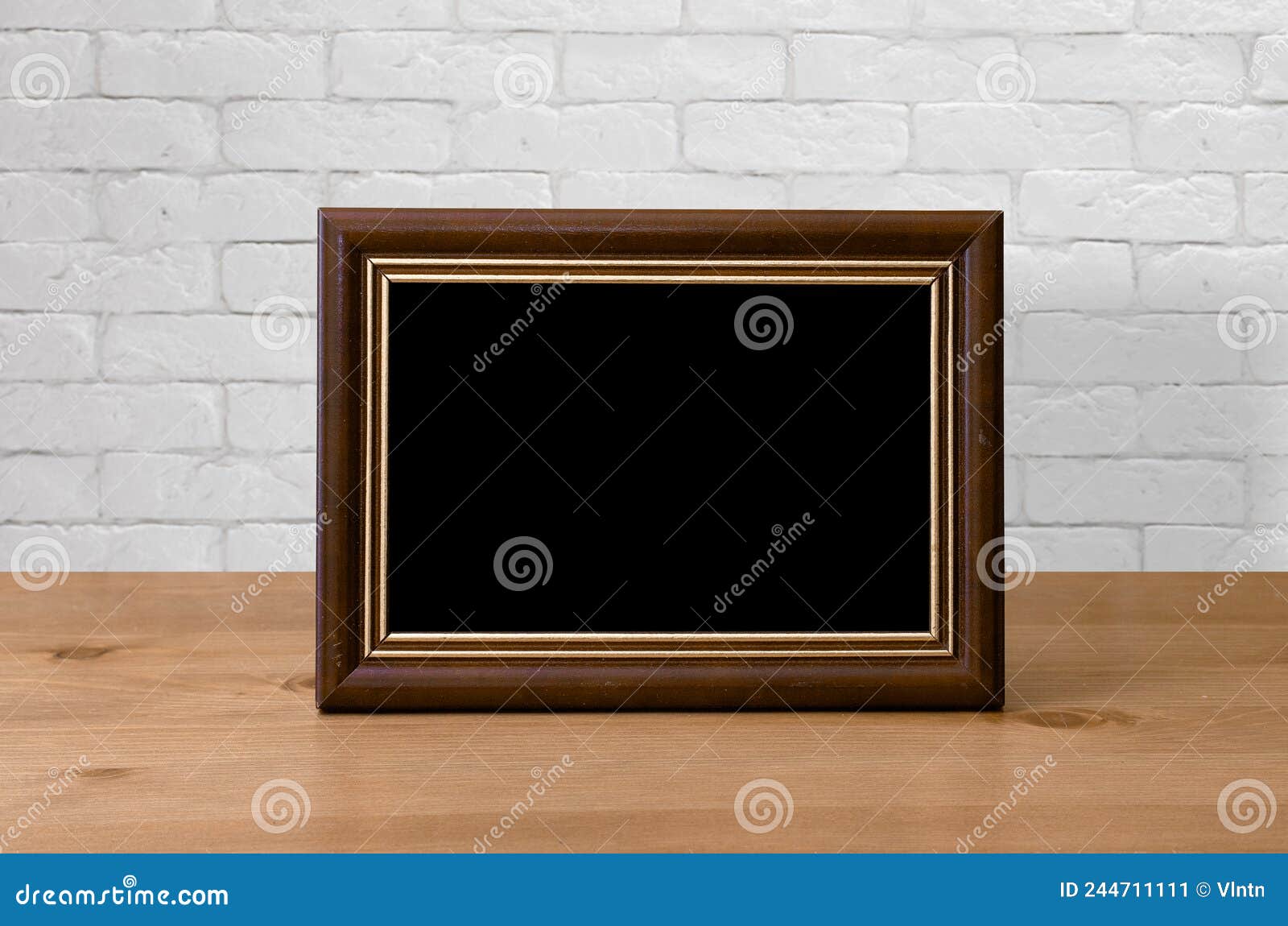 Photo frame on the table stock image. Image of frame - 244711111