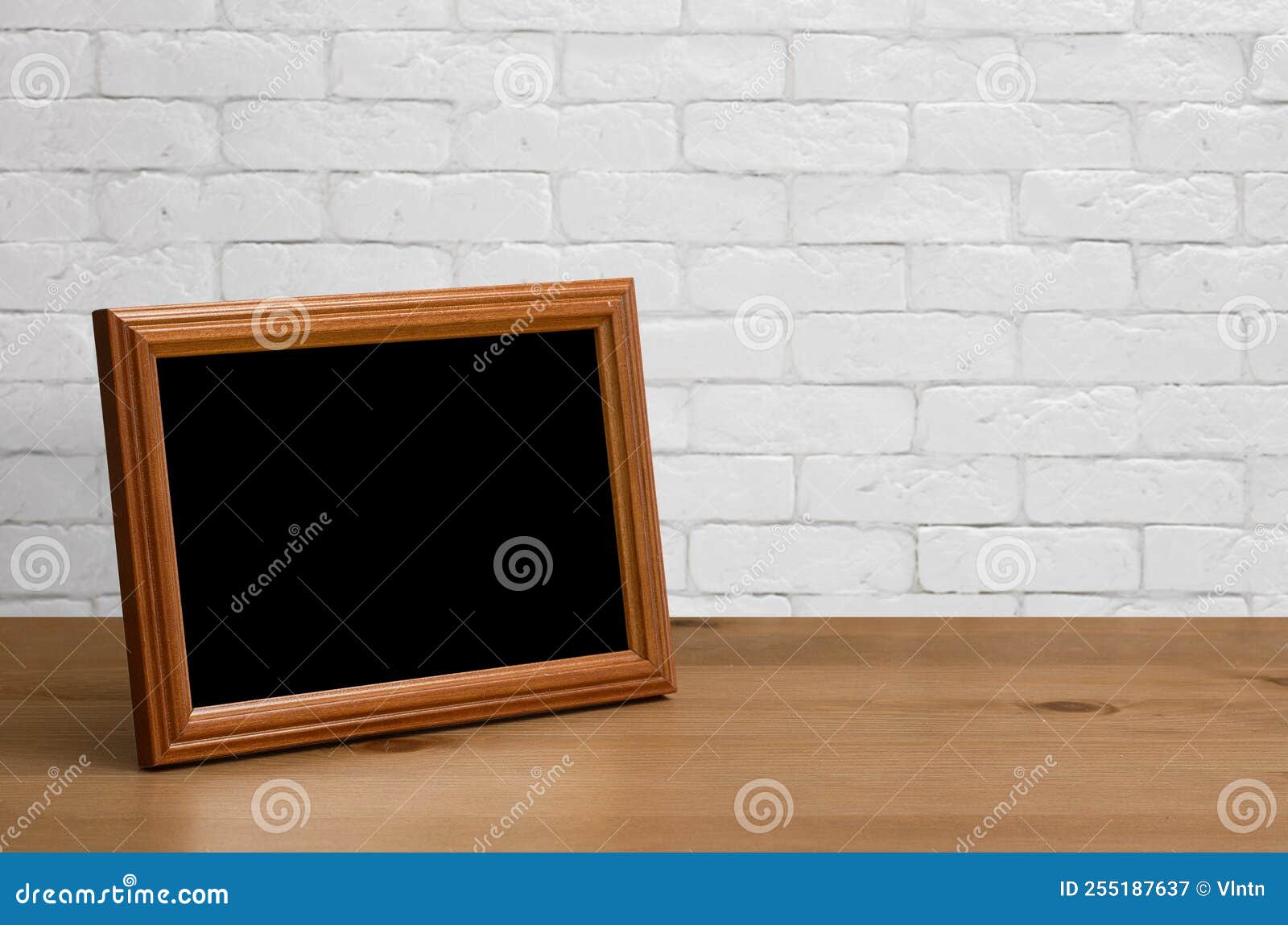 Photo frame on the table stock image. Image of decor - 255187637