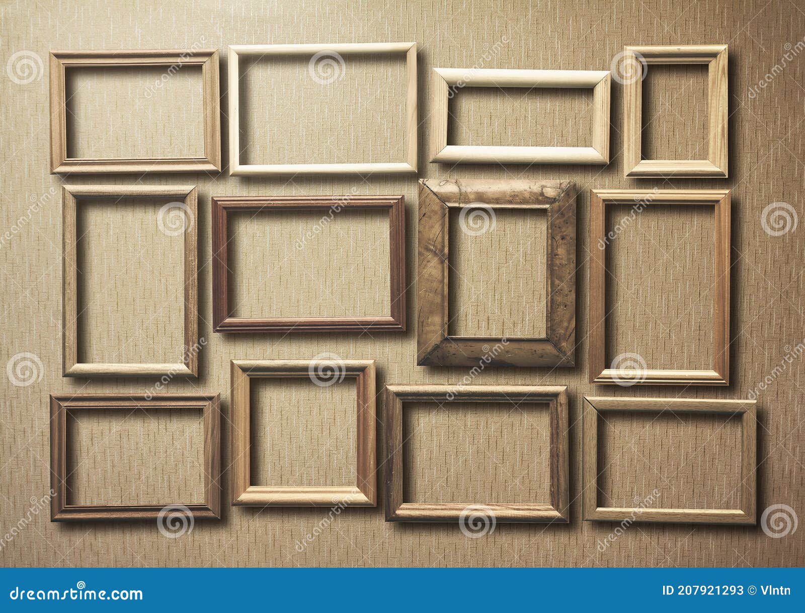 Old frames on wooden wall stock image. Image of frames - 207921293