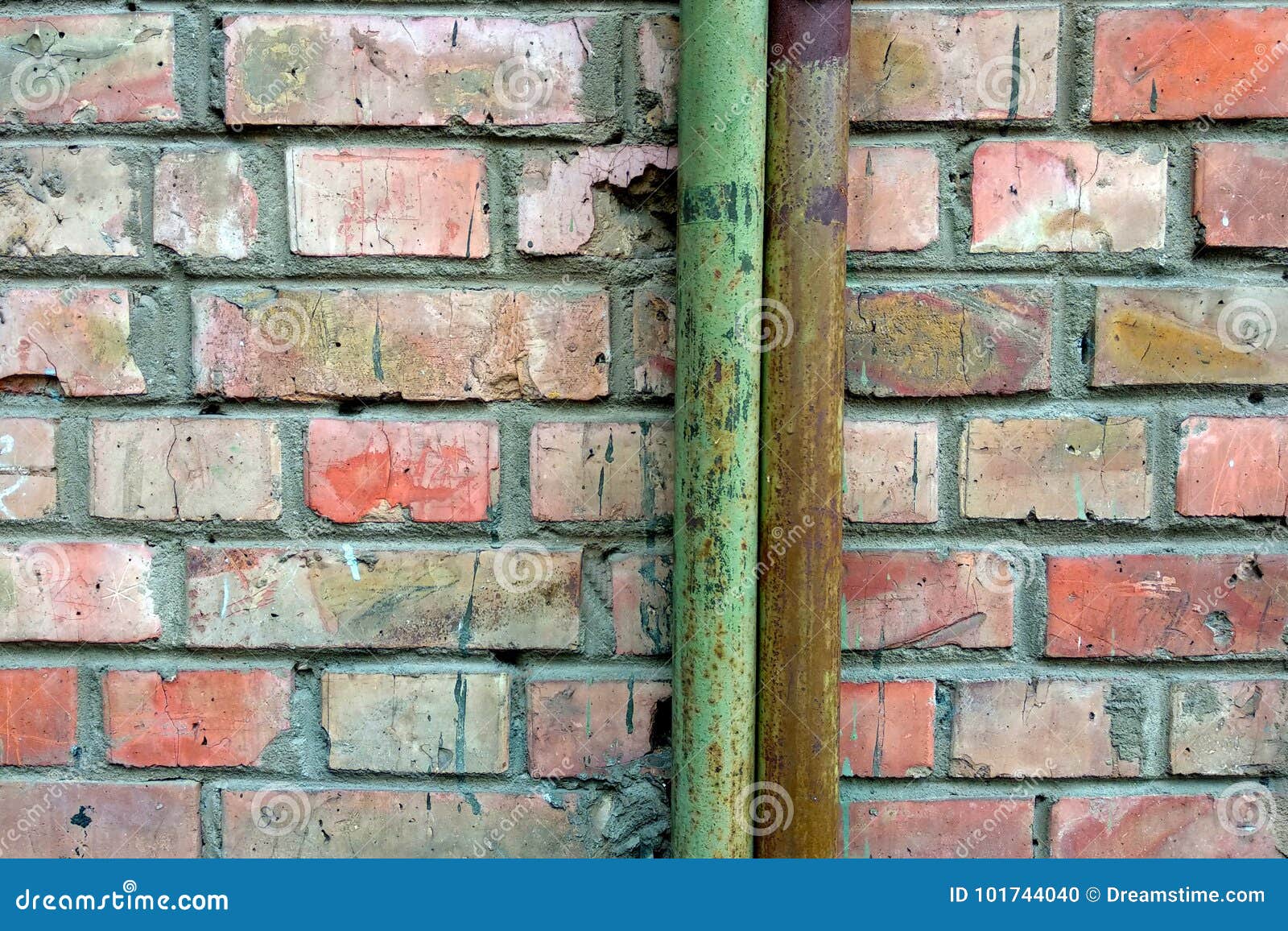 Old pipes on a brick wall stock photo. Image of montreal - 101744040