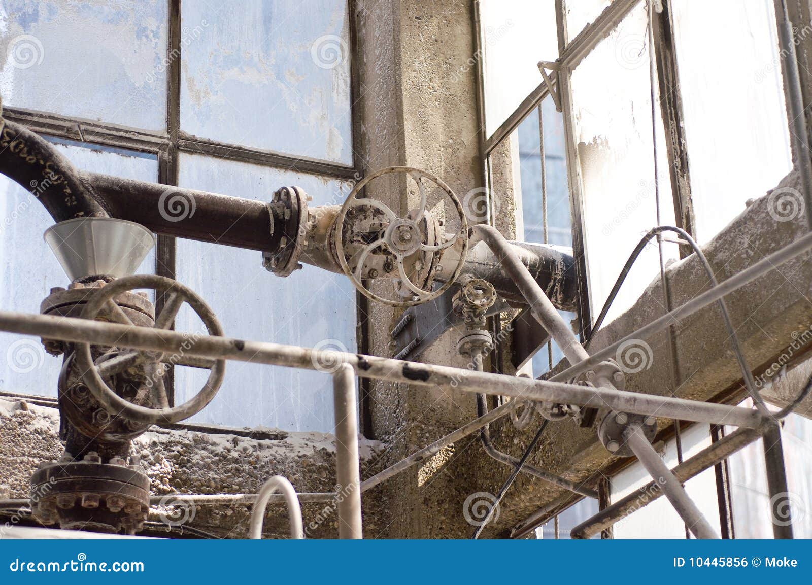 Old pipes and valves stock photo. Image of piping, derelict - 10445856