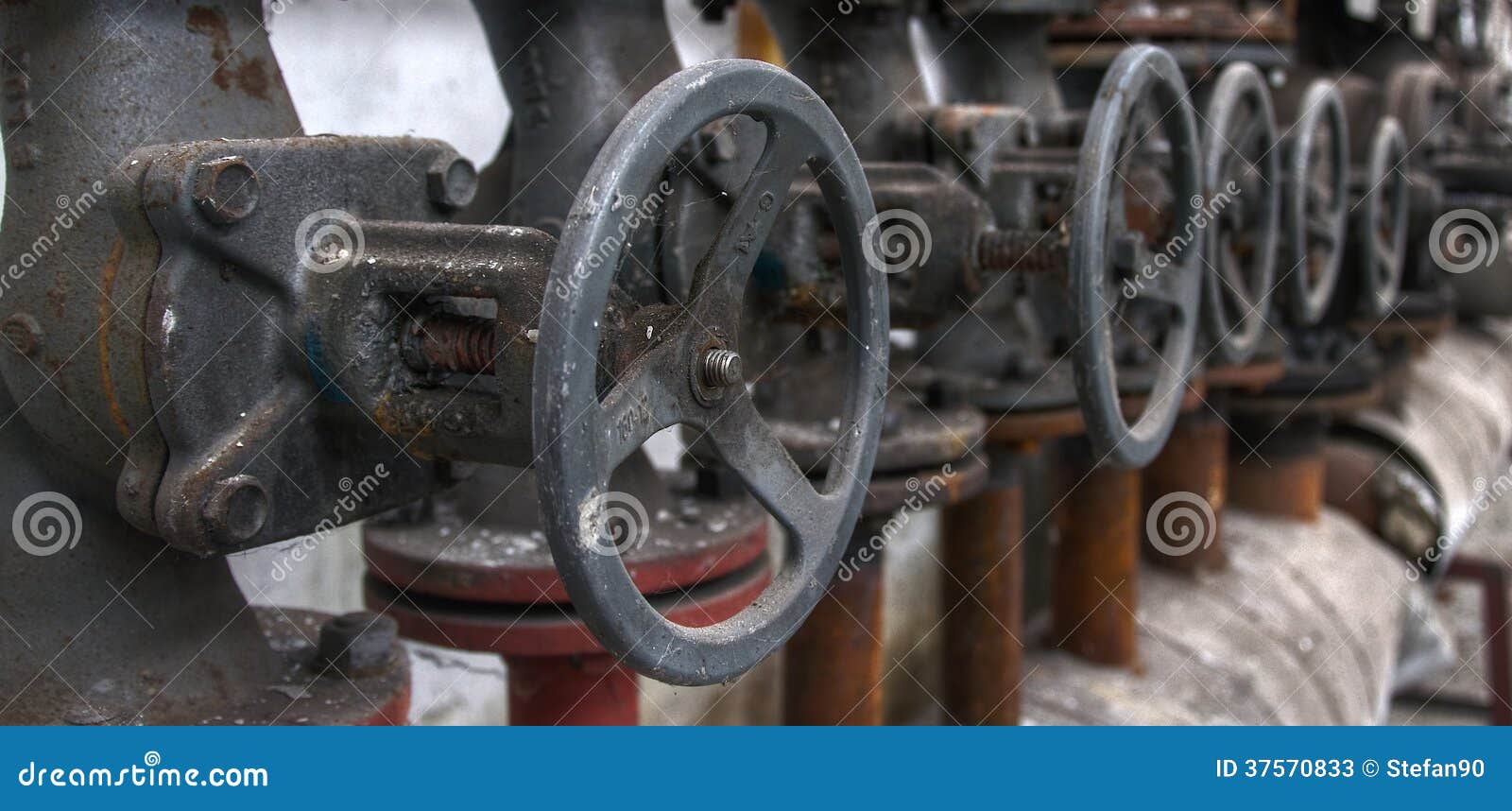 Old pipes with valves stock image. Image of equipment - 37570833