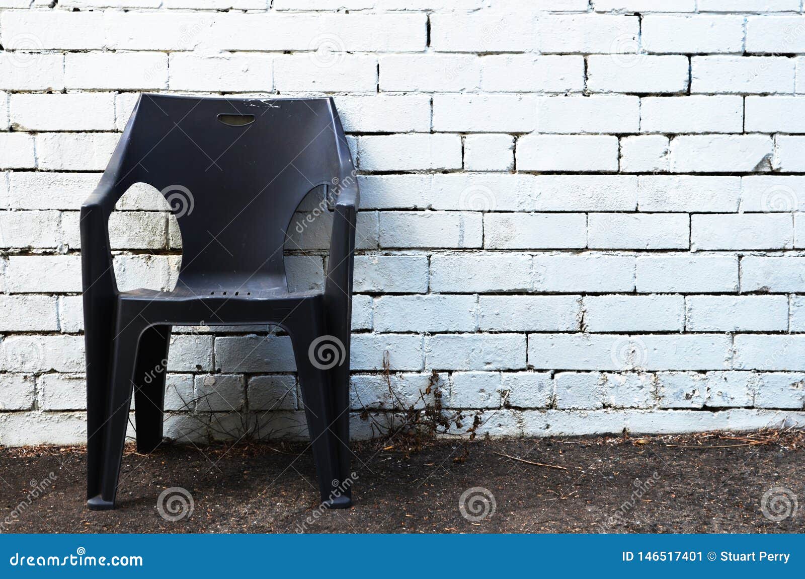 Old Plastic Chair Against Wall Stock Image - Image of couple, minimal ...