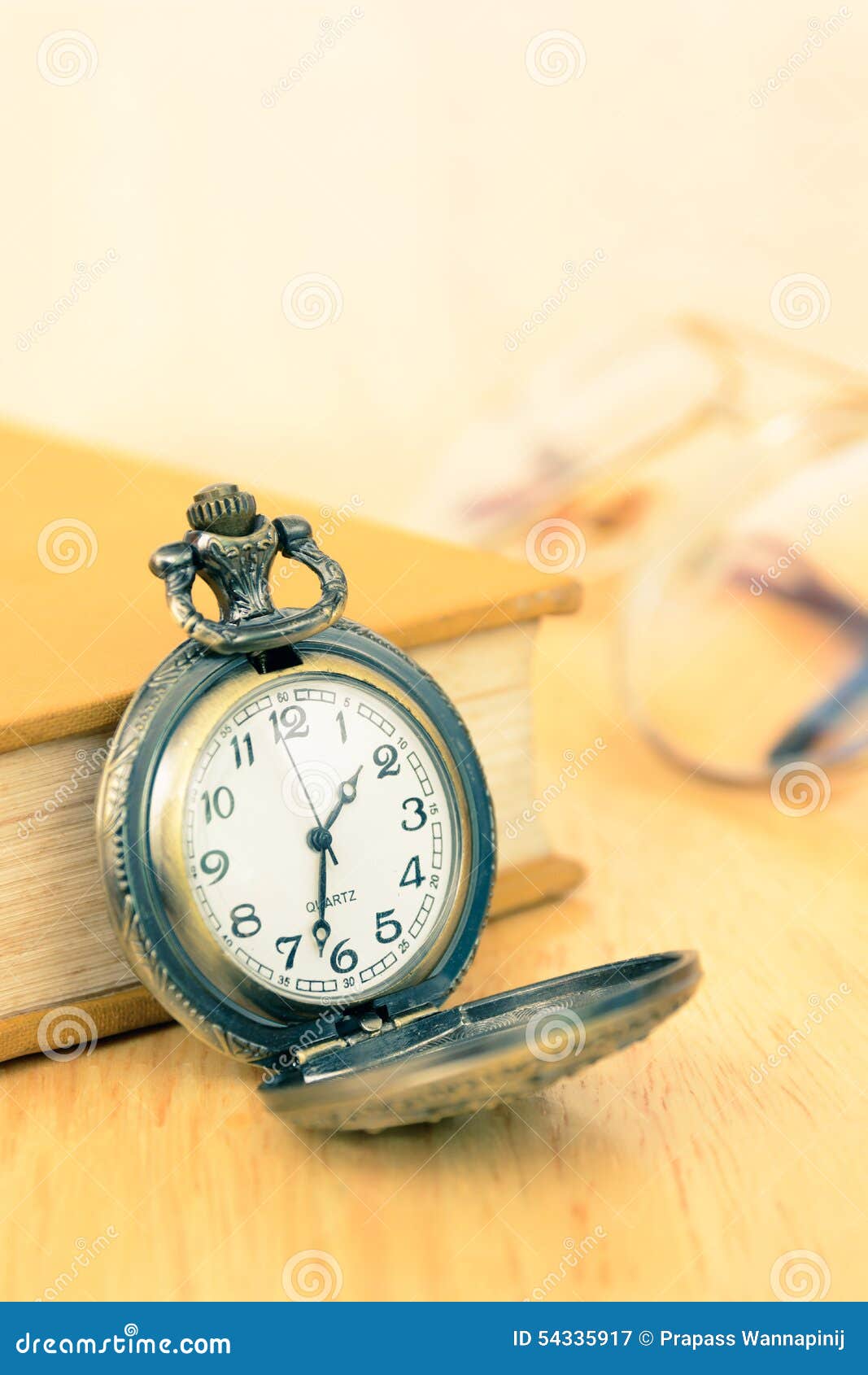 Old pocket watch and book stock image. Image of aged - 54335917