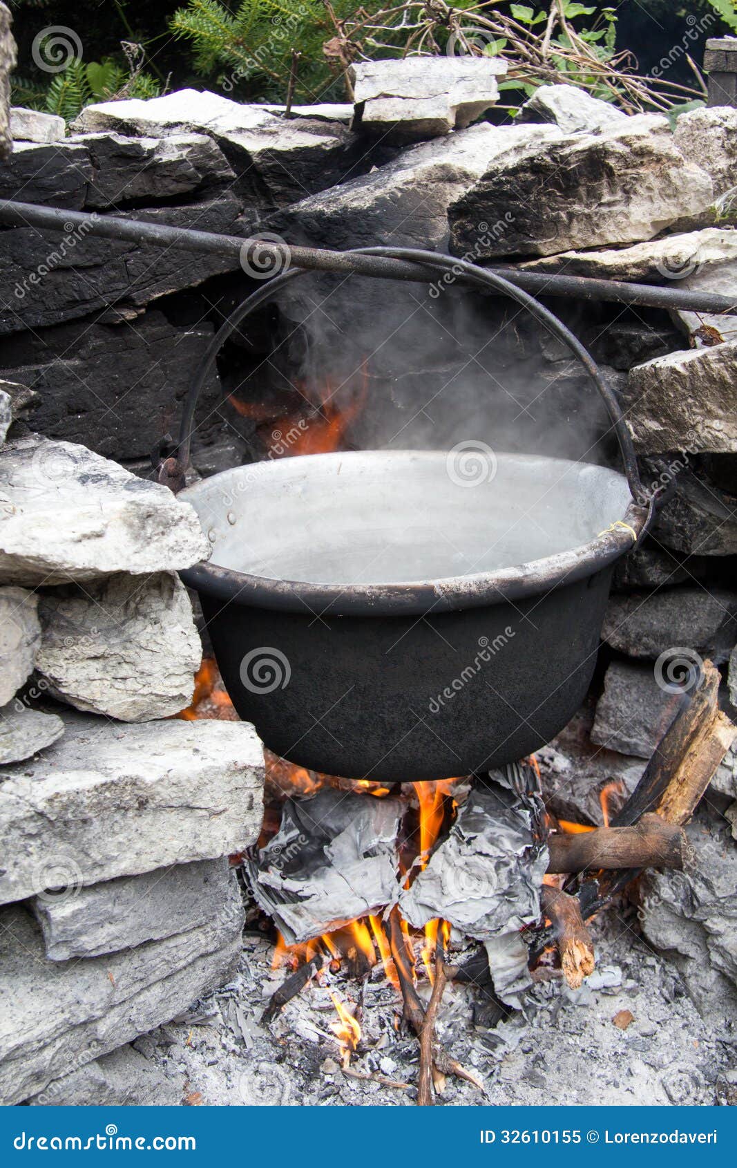 Old pot on fire outside stock image. Image of nature - 32610155