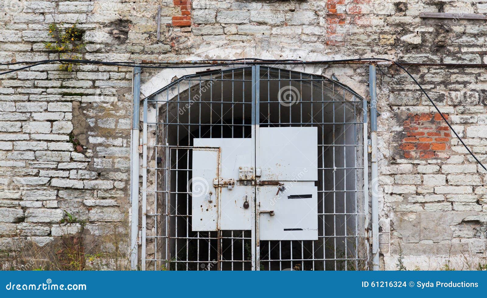 Old prison gate stock photo. Image of entrance, brick - 61216324