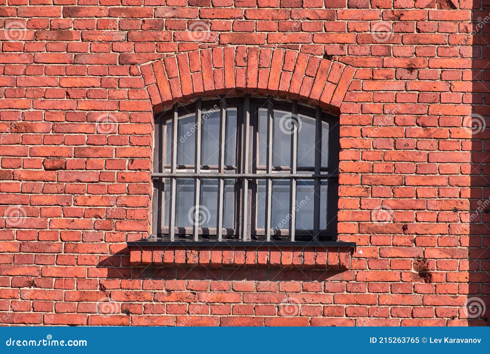 The Old Prison Window on the Red Brick Wall Stock Image - Image of ...