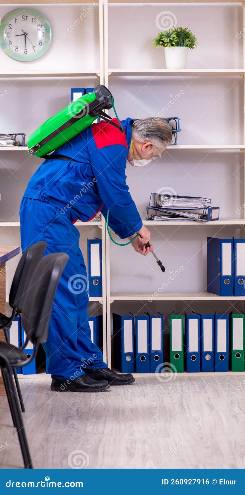 Old Professional Contractor Doing Pest Control in the Office Stock ...