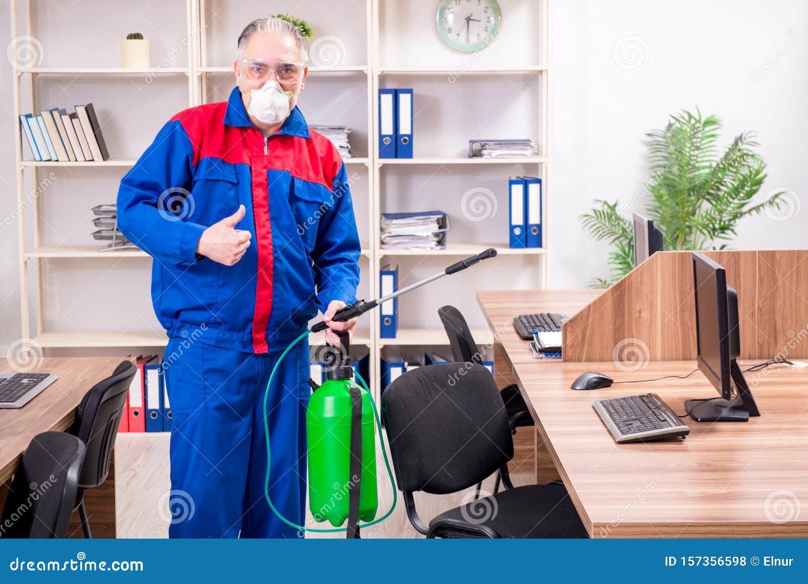 Old Professional Contractor Doing Pest Control in the Office Stock ...