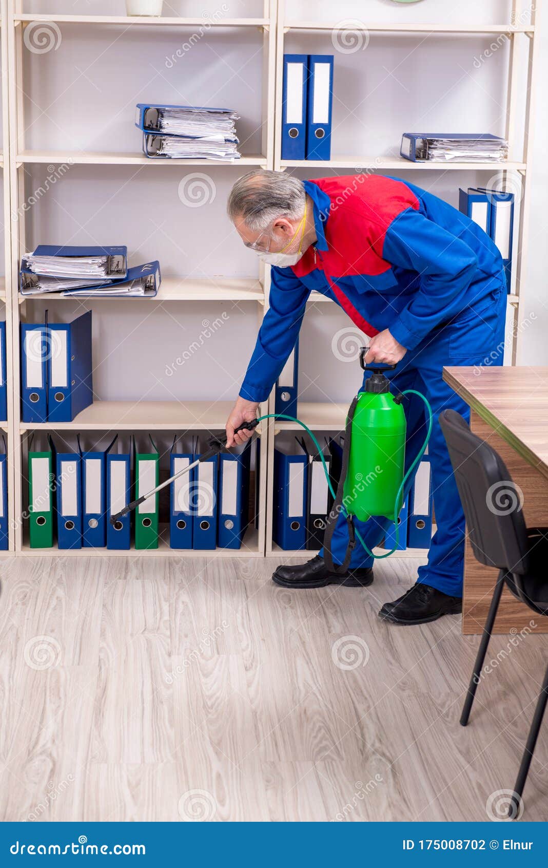 Old Professional Contractor Doing Pest Control in the Office Stock ...