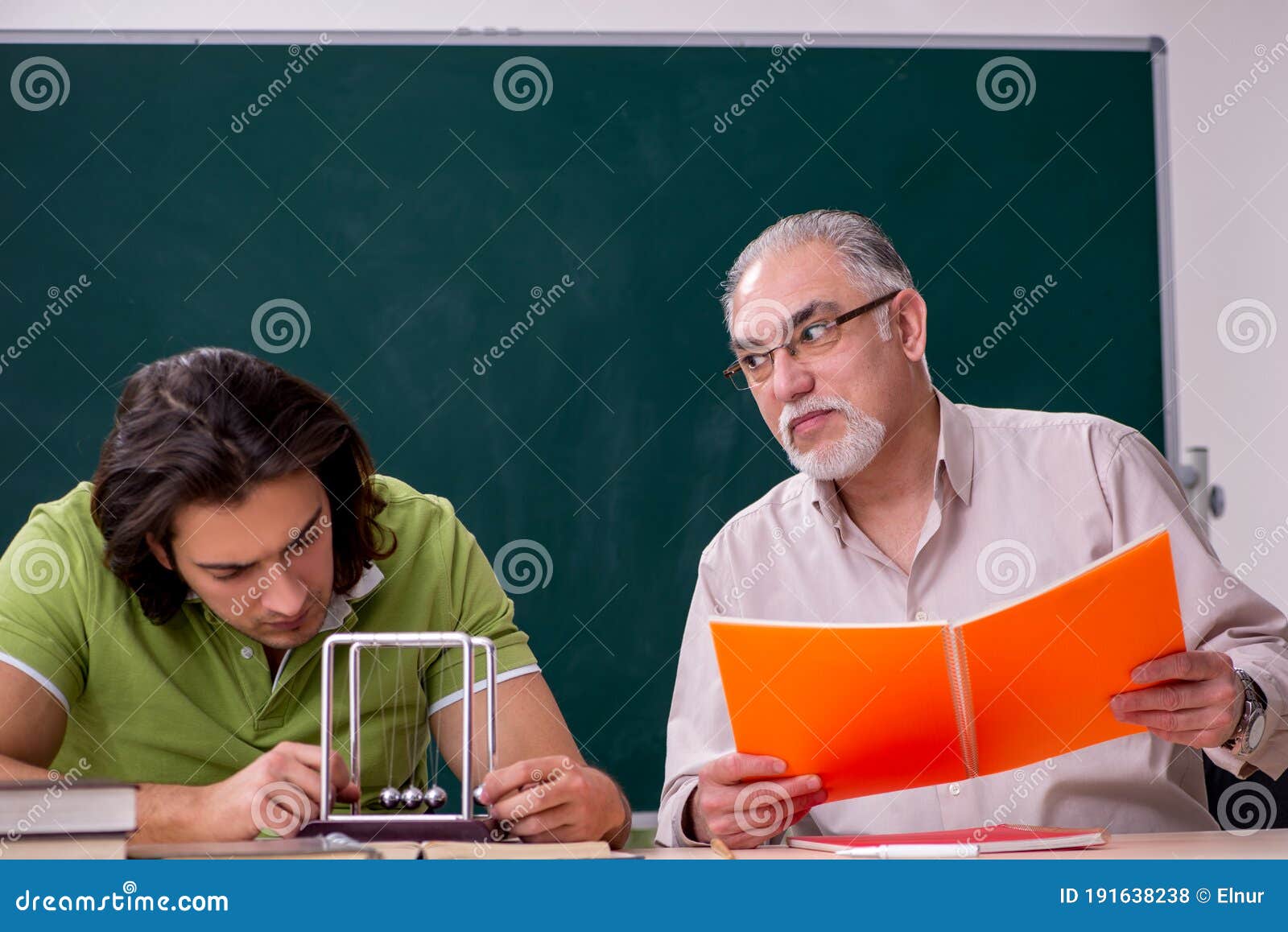 Old Professor Physicist and Young Student in the Classroom Stock Photo ...