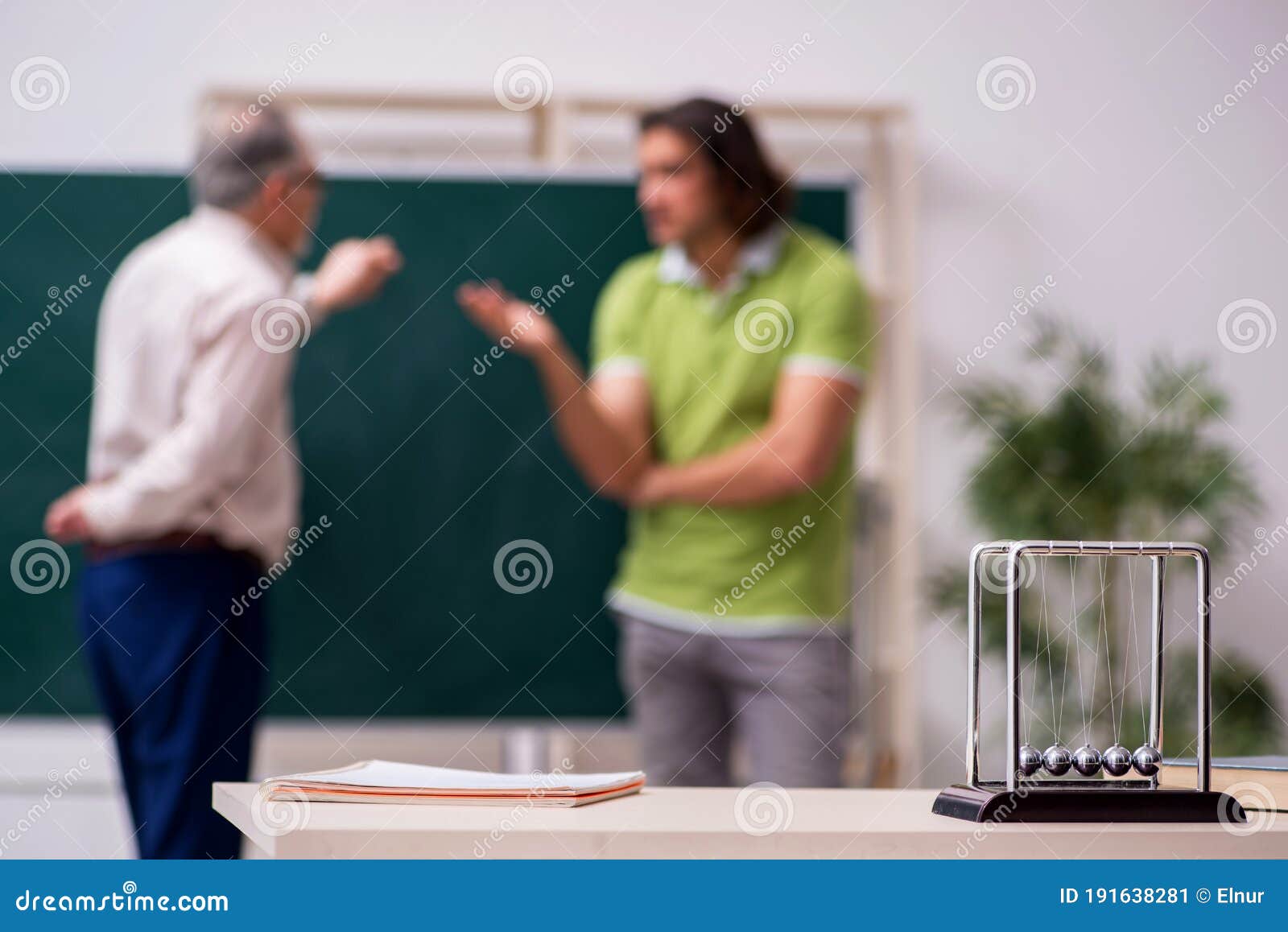 Old Professor Physicist and Young Student in the Classroom Stock Image ...