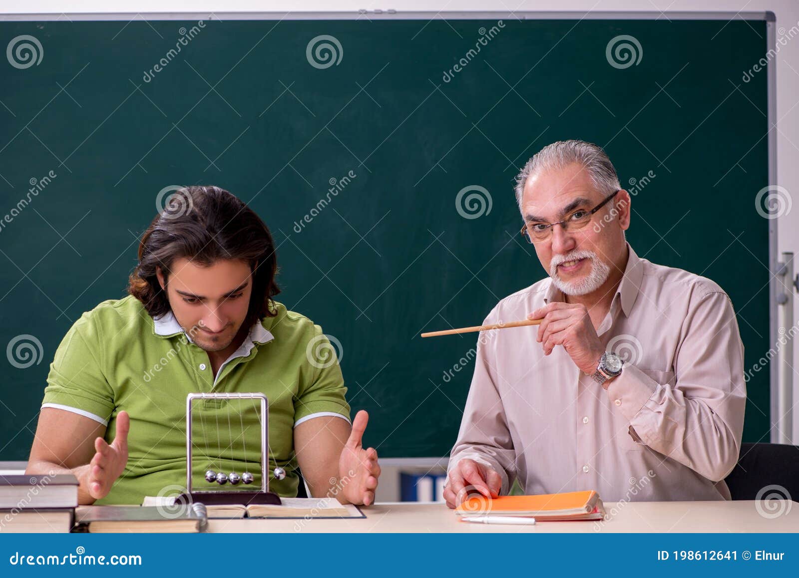 Old Professor Physicist and Young Student in the Classroom Stock Image ...