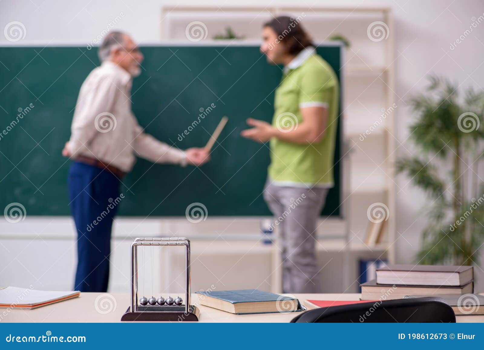 Old Professor Physicist and Young Student in the Classroom Stock Image ...