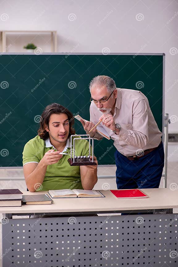 Old Professor Physicist and Young Student in the Classroom Stock Photo ...