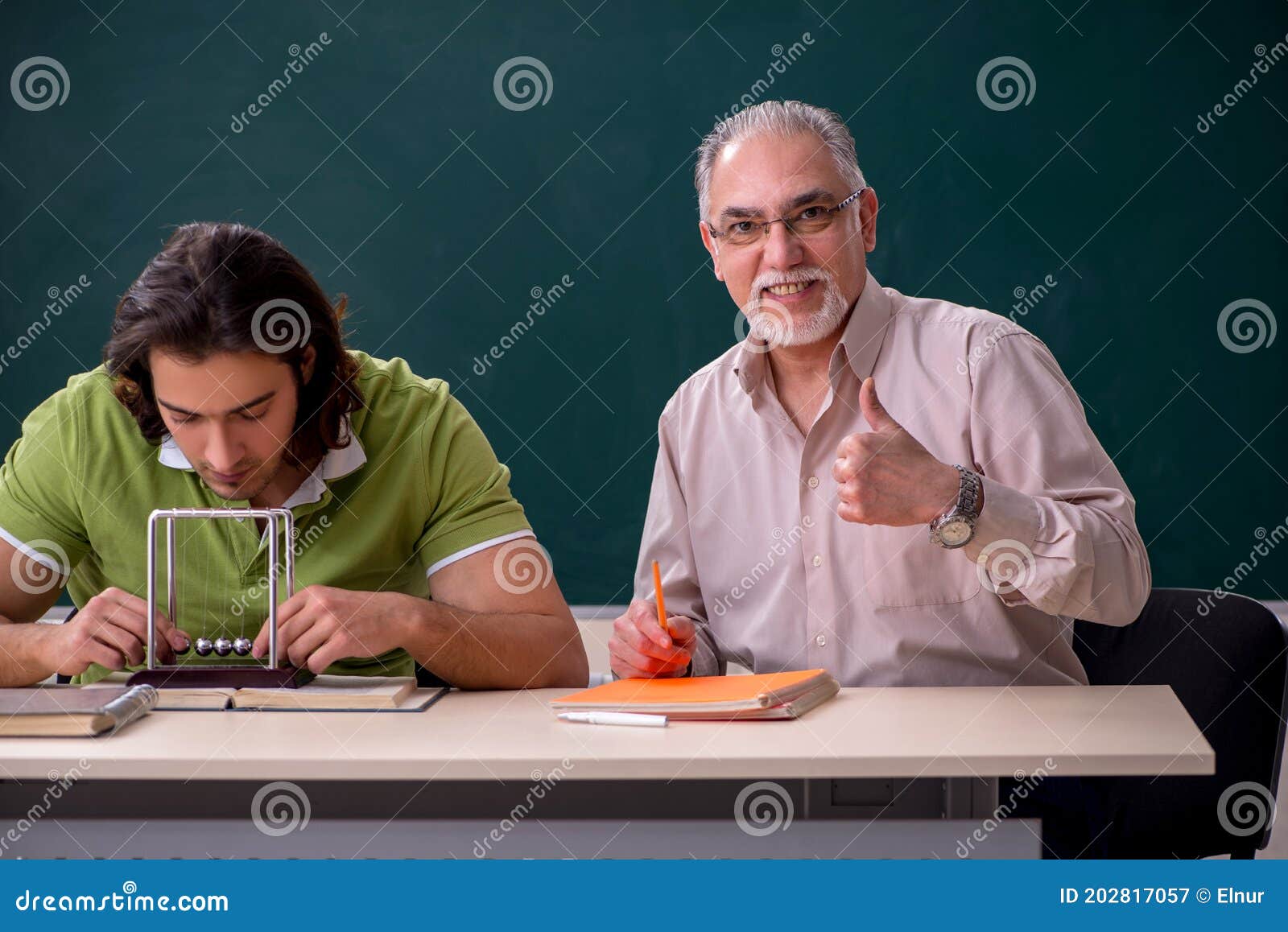 Old Professor Physicist and Young Student in the Classroom Stock Image ...