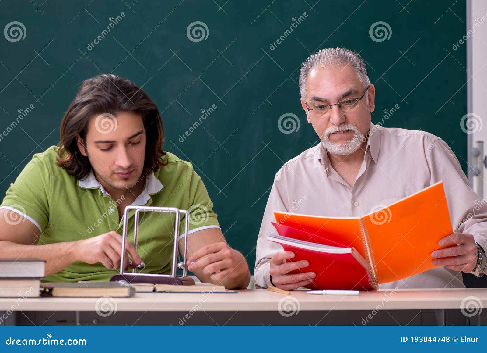 Old Professor Physicist and Young Student in the Classroom Stock Photo ...