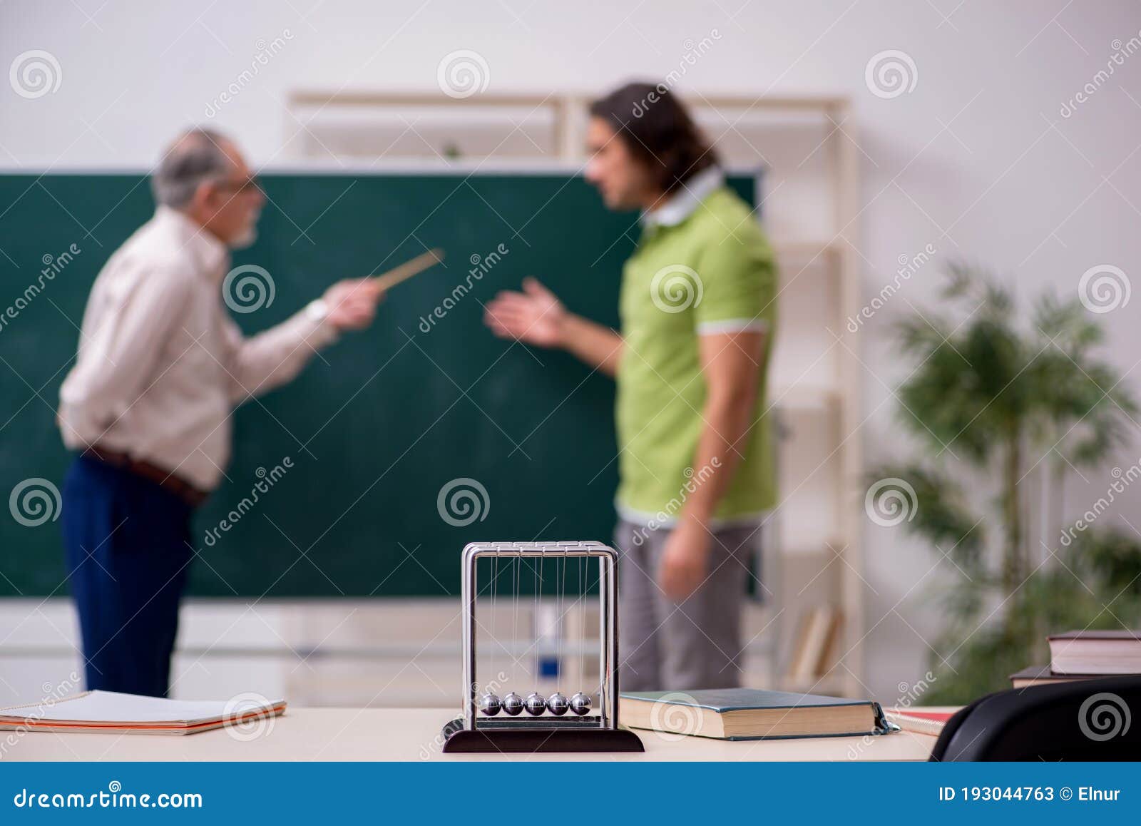 Old Professor Physicist and Young Student in the Classroom Stock Image ...