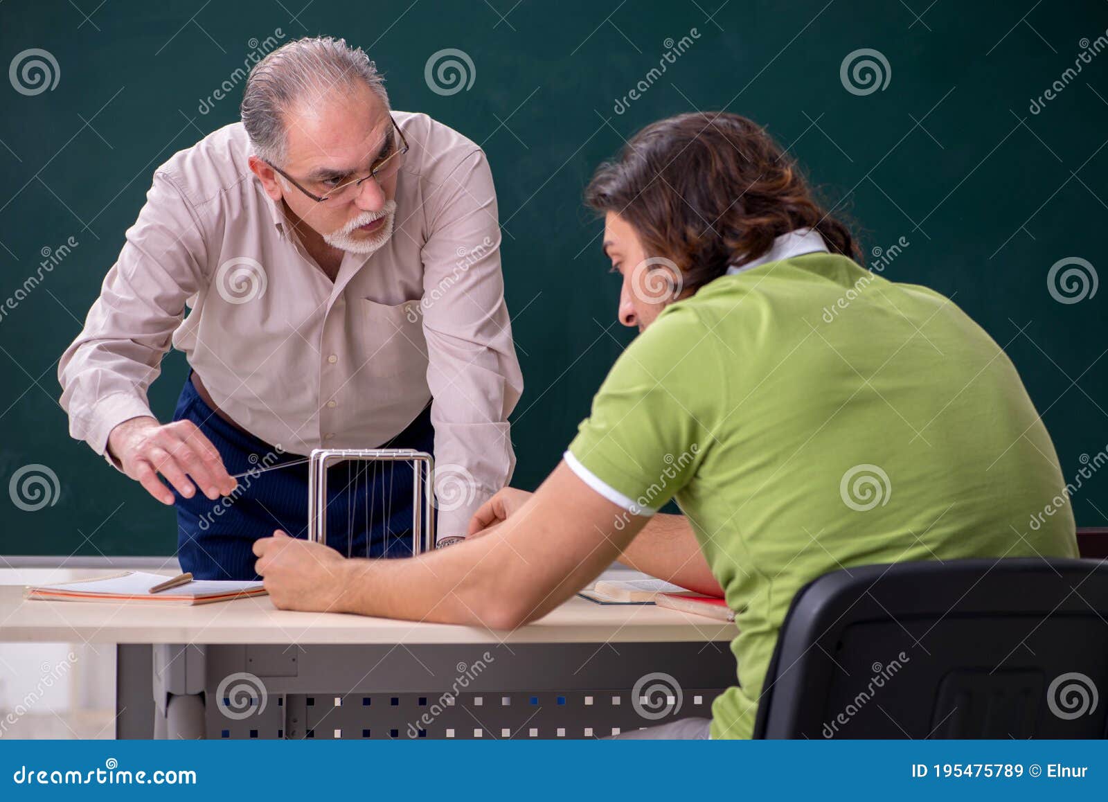 Old Professor Physicist and Young Student in the Classroom Stock Image ...