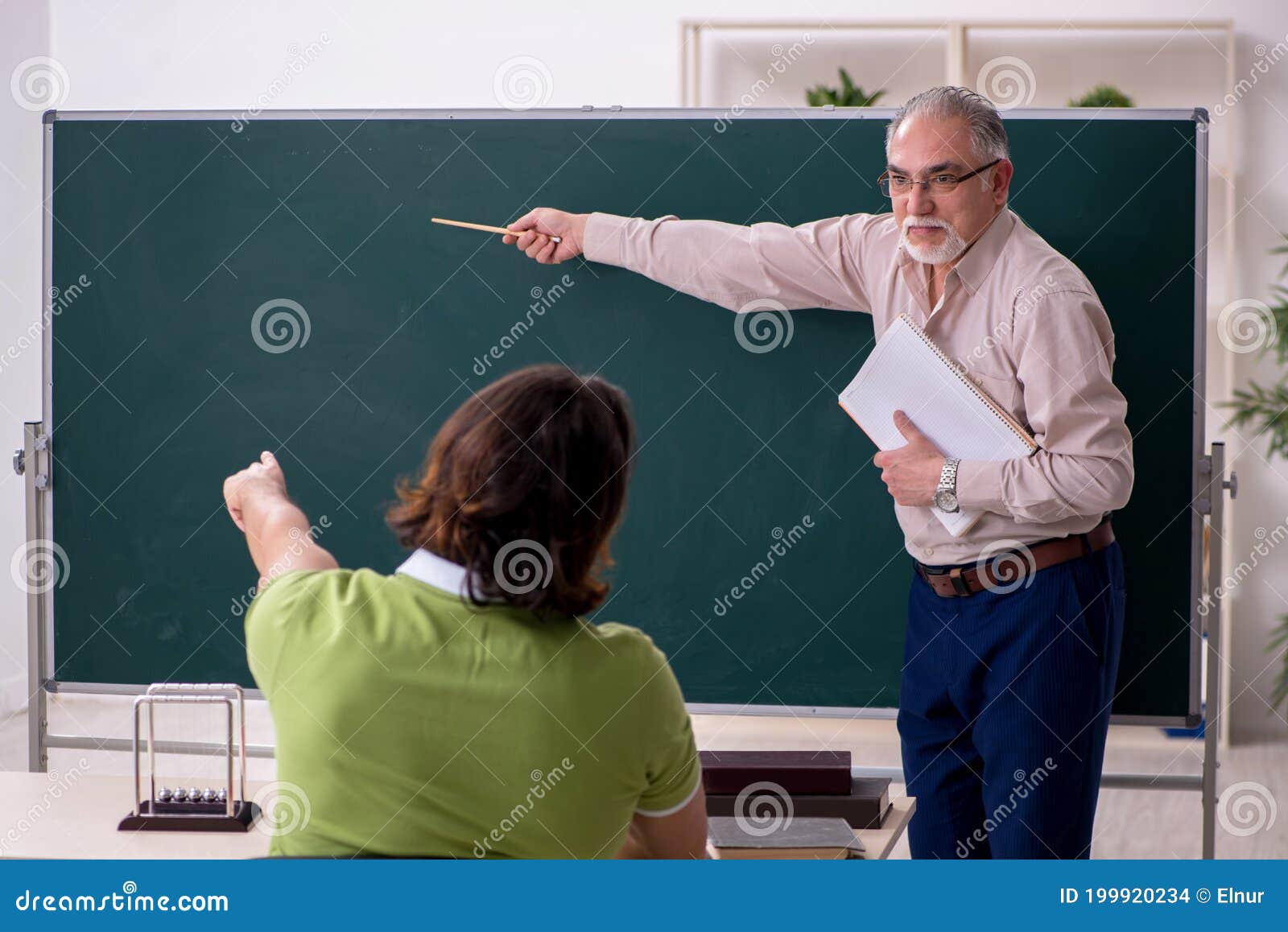 Old Professor Physicist and Young Student in the Classroom Stock Photo ...