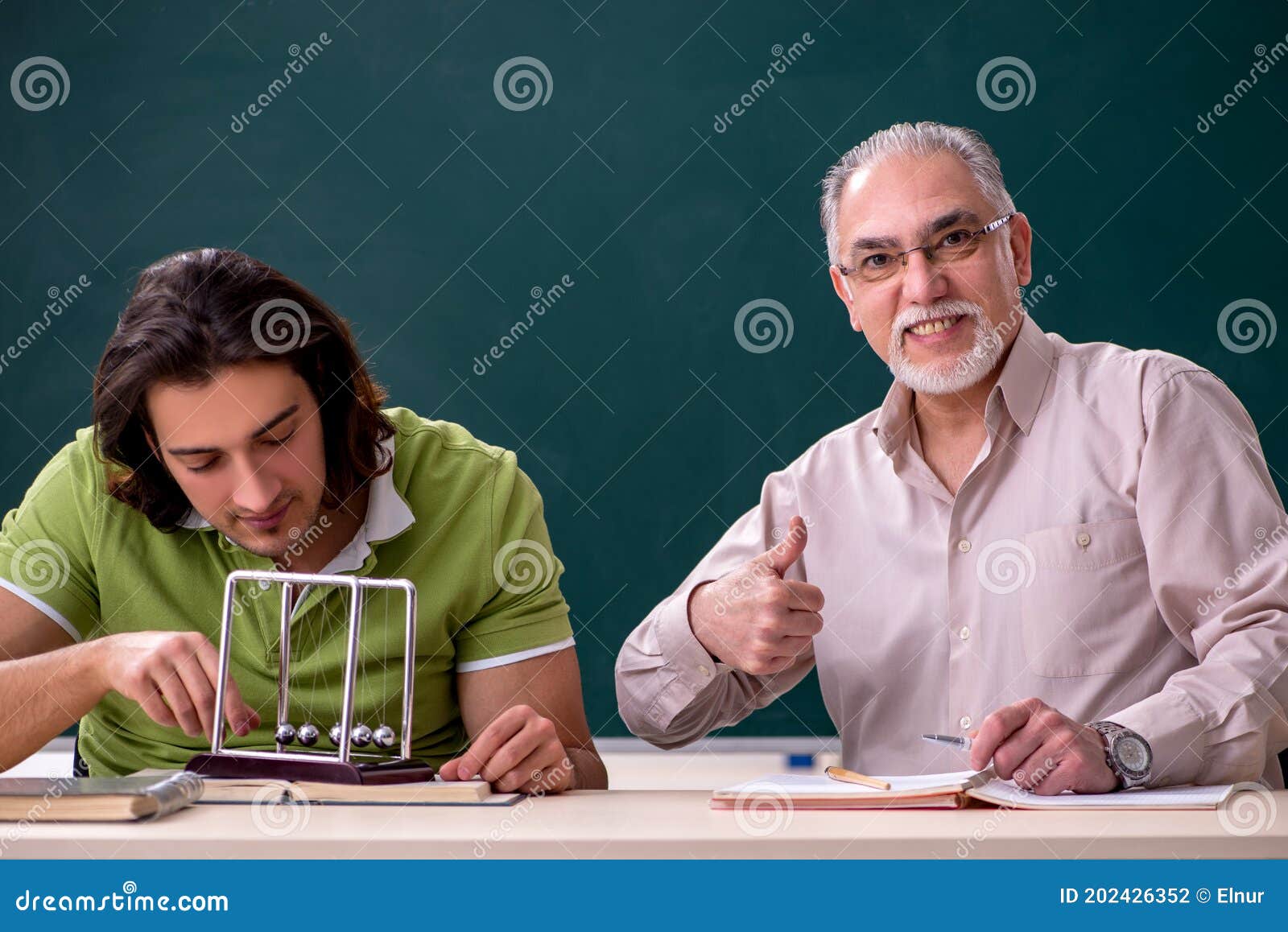 Old Professor Physicist and Young Student in the Classroom Stock Photo ...