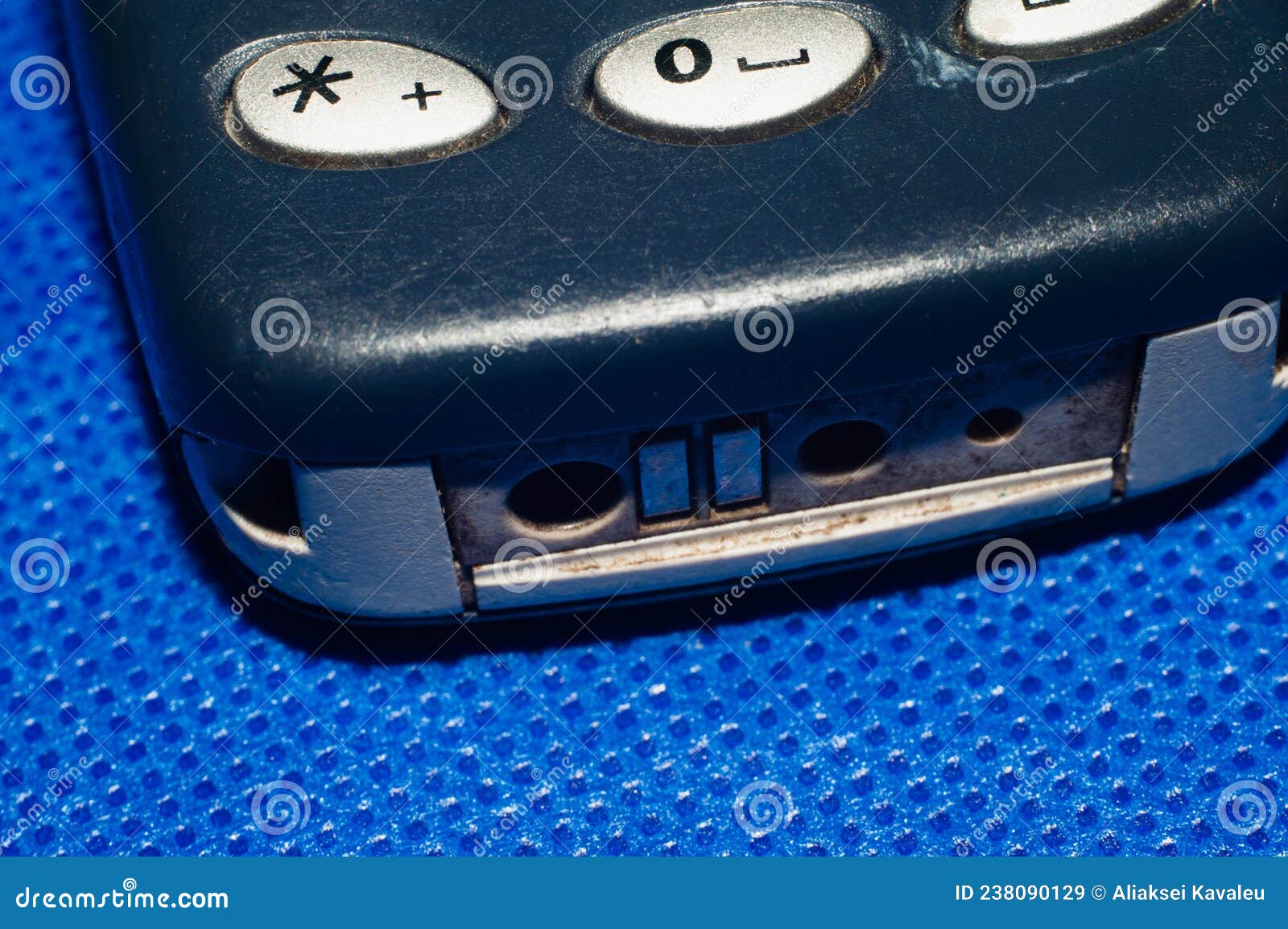 Old Push-button Cell Phone on Blue Background Stock Image - Image of ...